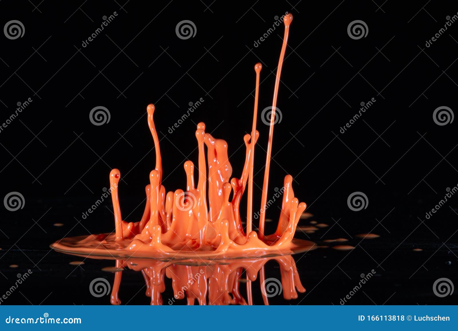 Orange Ink Splash on a Black Background Stock Photo - Image of orange ...