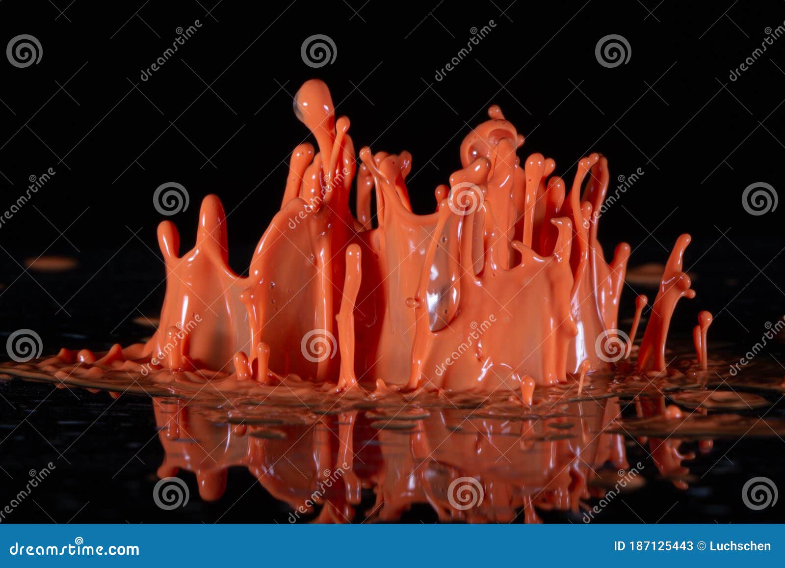 Orange Ink Splash on a Black Background Stock Image - Image of stain ...
