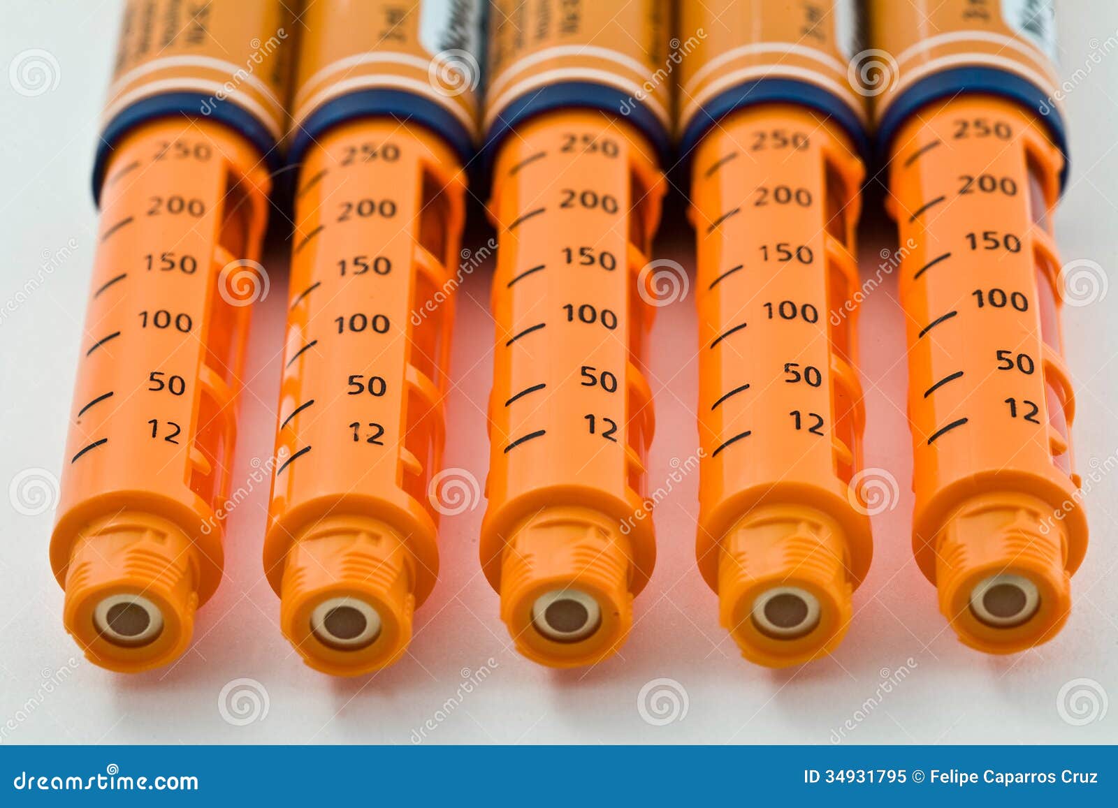 Orange insulin dosers stock image. Image of focus, glaucometer - 34931795