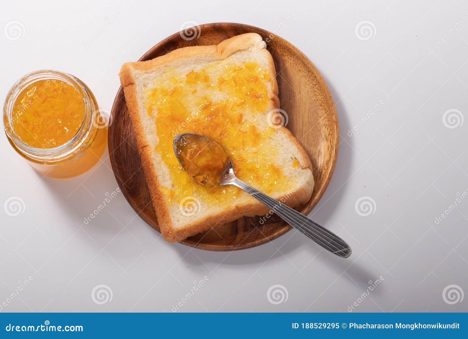 Orange Jam and Bread, Spread the Jam on a White Background Stock Image ...