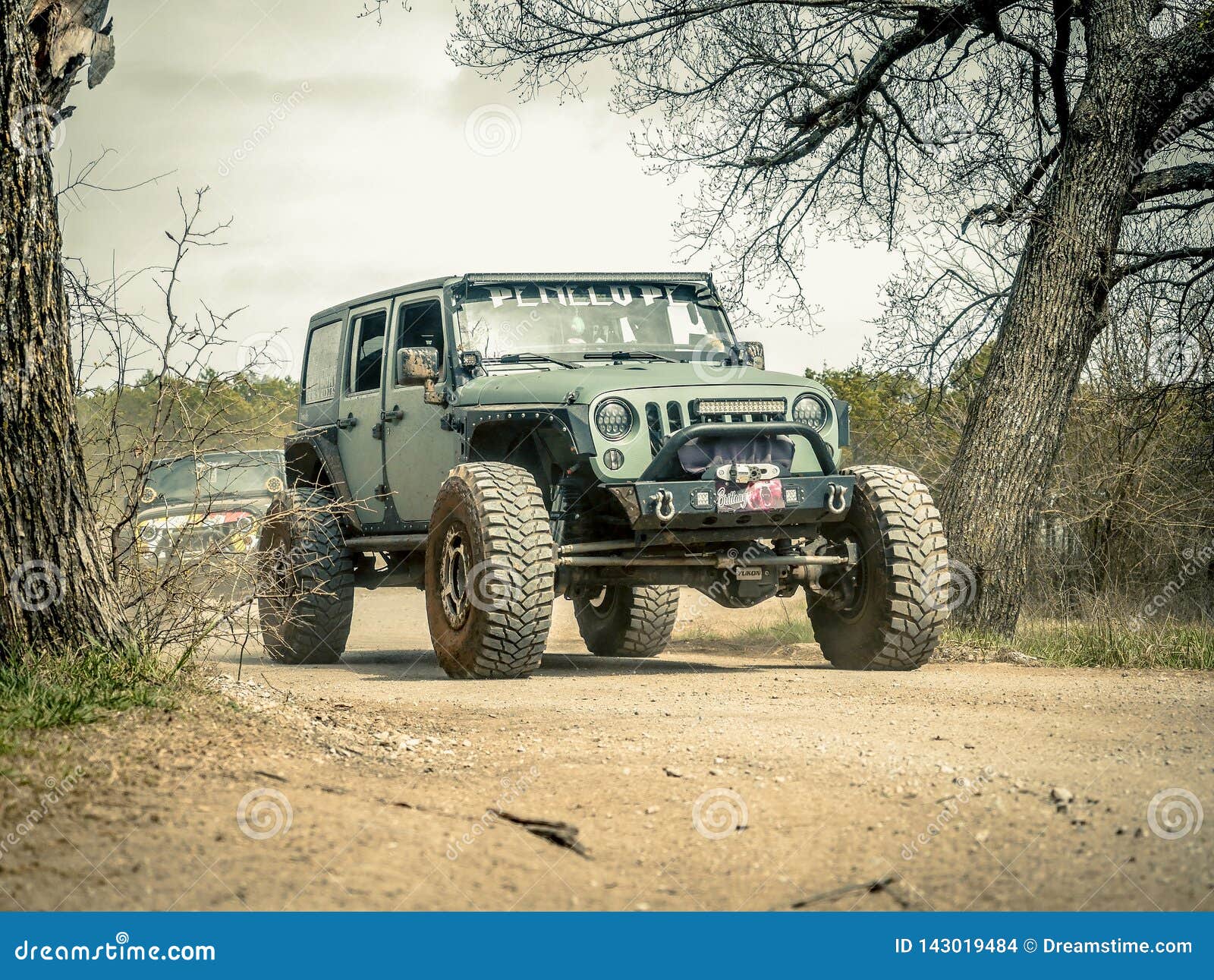 Orange Jeep Rock Crawling editorial stock image. Image of crawler ...