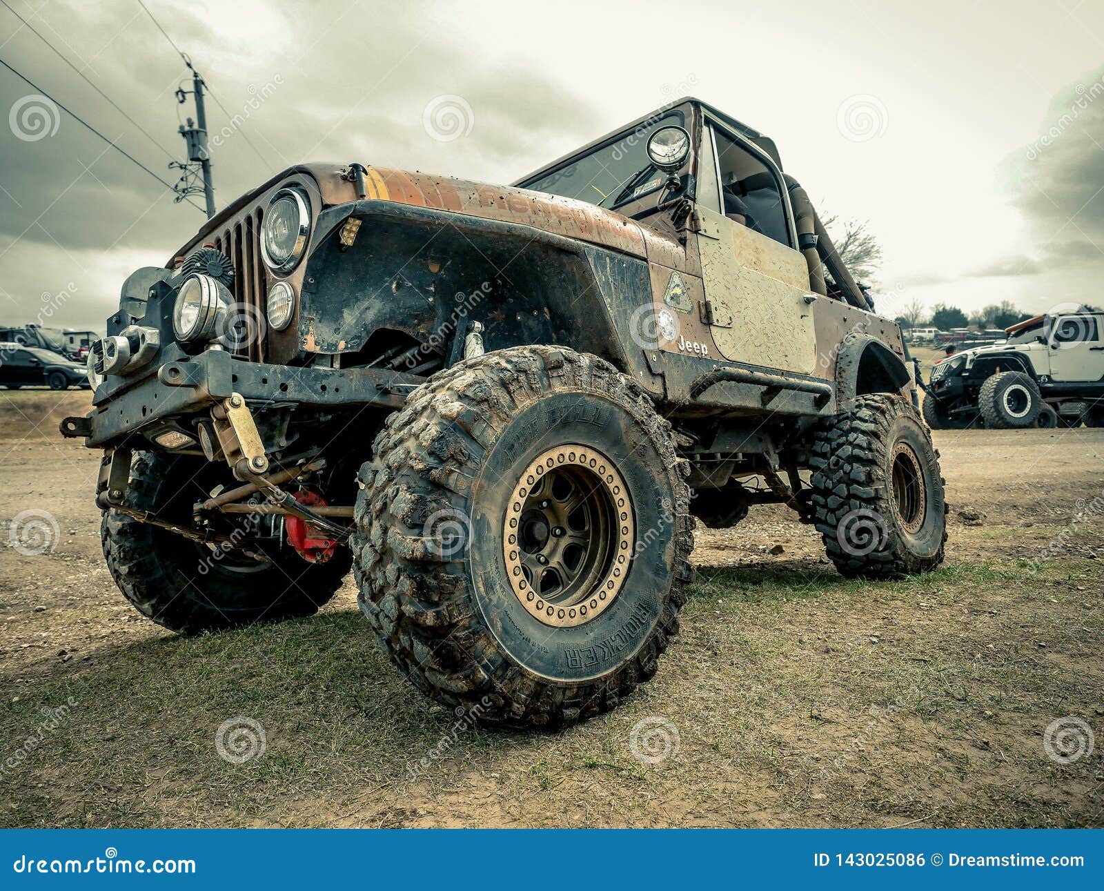 Orange Jeep Rock Crawling editorial photo. Image of chief - 143025086