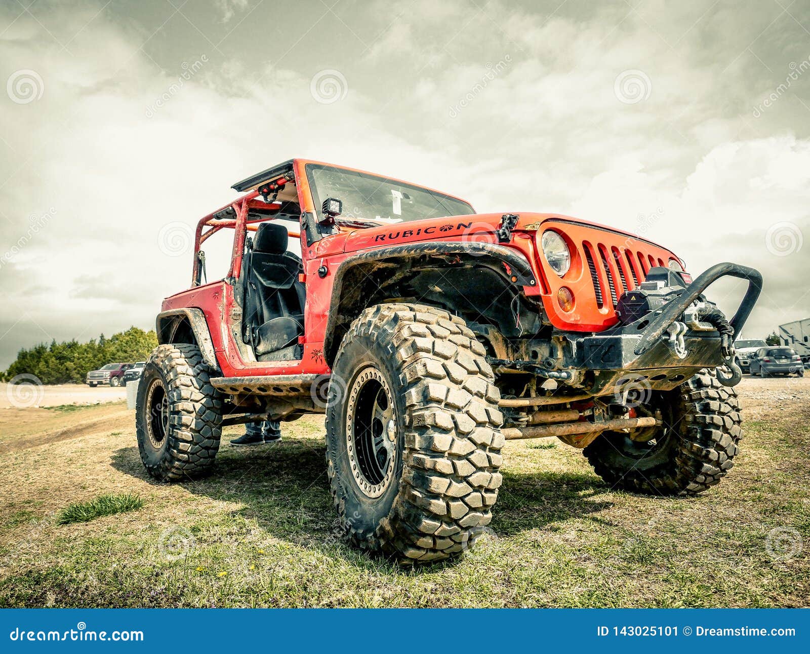 Orange Jeep Rock Crawling editorial photo. Image of door - 143025101