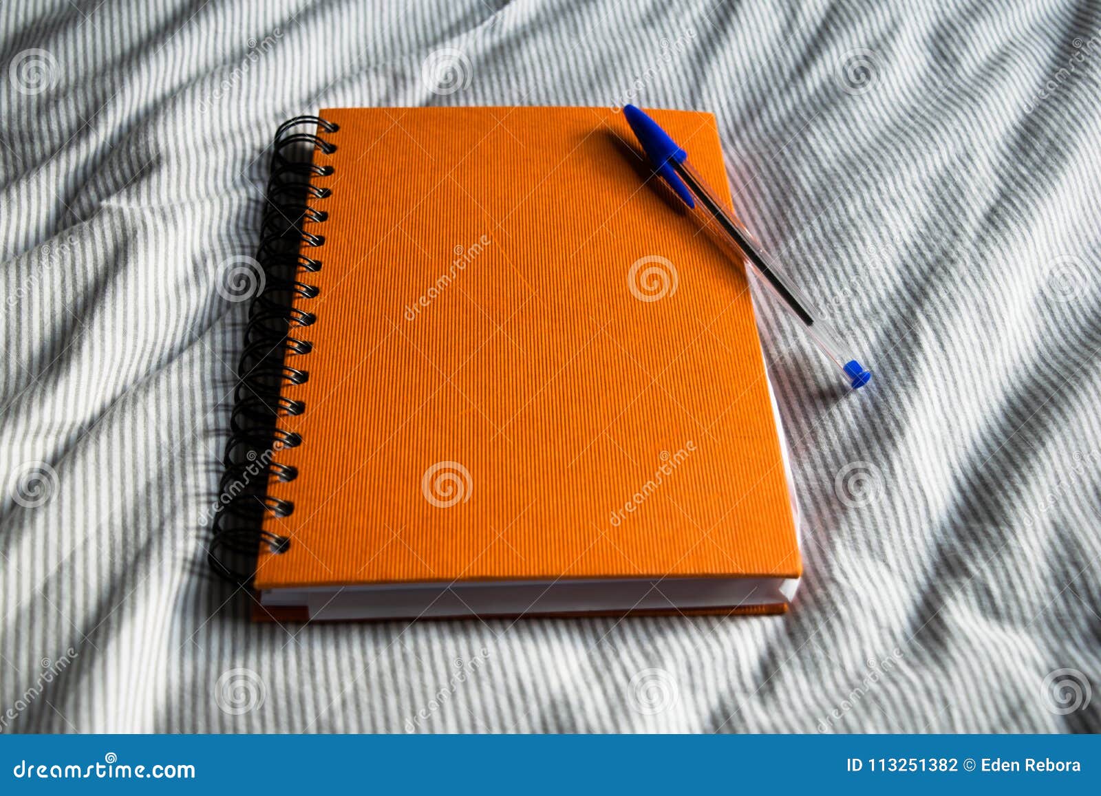 Orange Journal Notebook with Pen on Bed. Stock Photo - Image of coffee ...