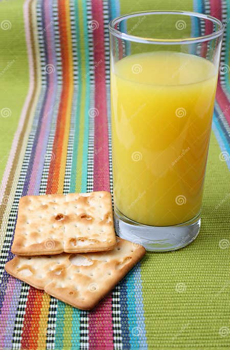 Orange Juice and Crackers stock image. Image of juice - 5652091