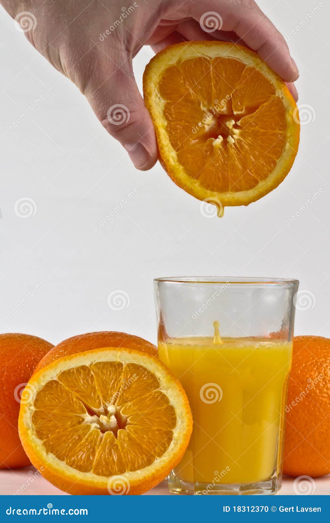 Orange Juice Dripping into Glass from Orange Fruit Stock Photo - Image ...