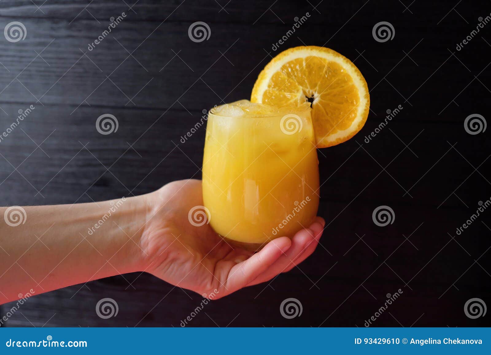 Orange Juice in Hand on Dark Background Stock Photo - Image of fruit ...