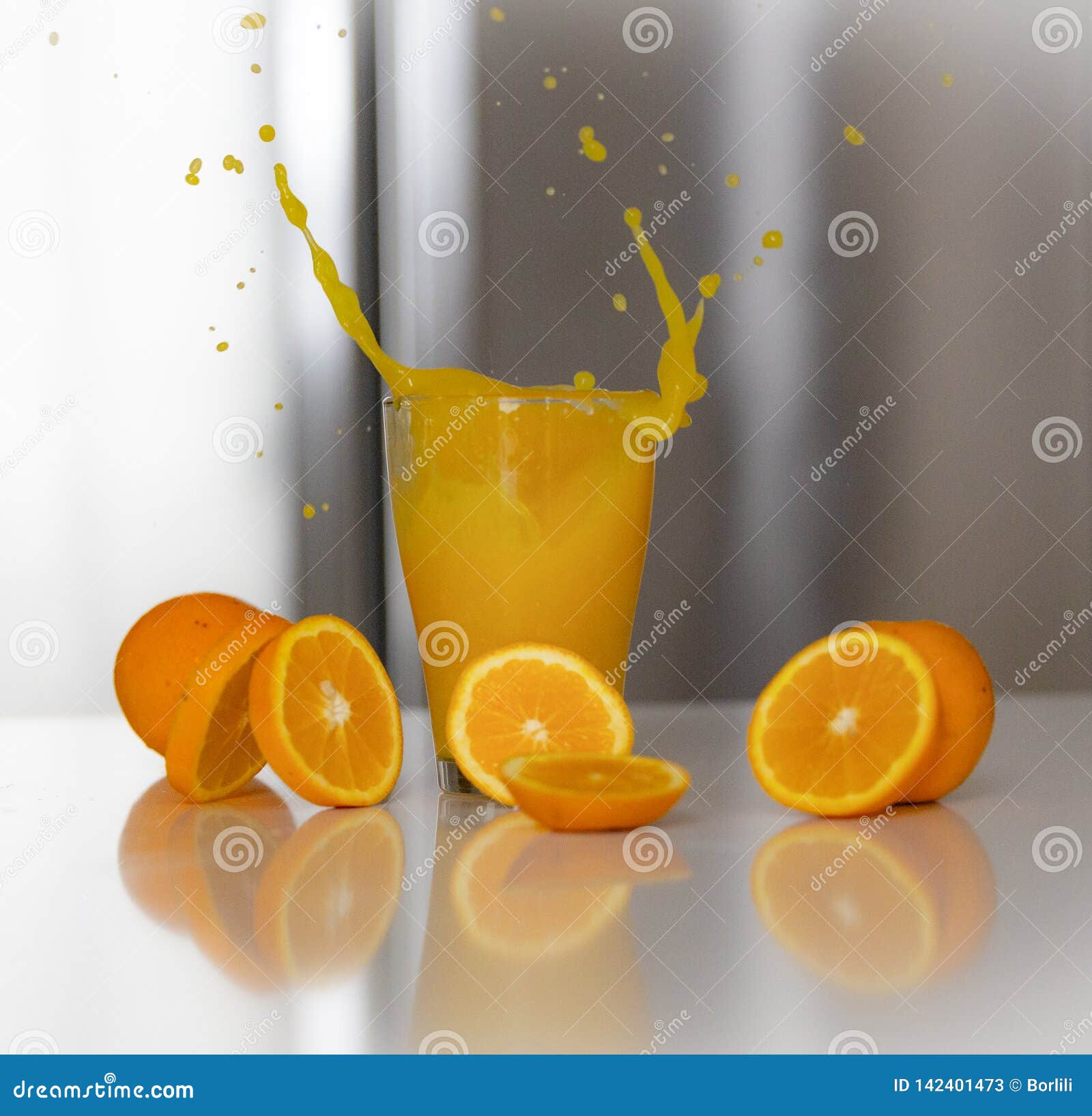 Orange juice splash stock image. Image of fruit, cutfreshness - 142401473