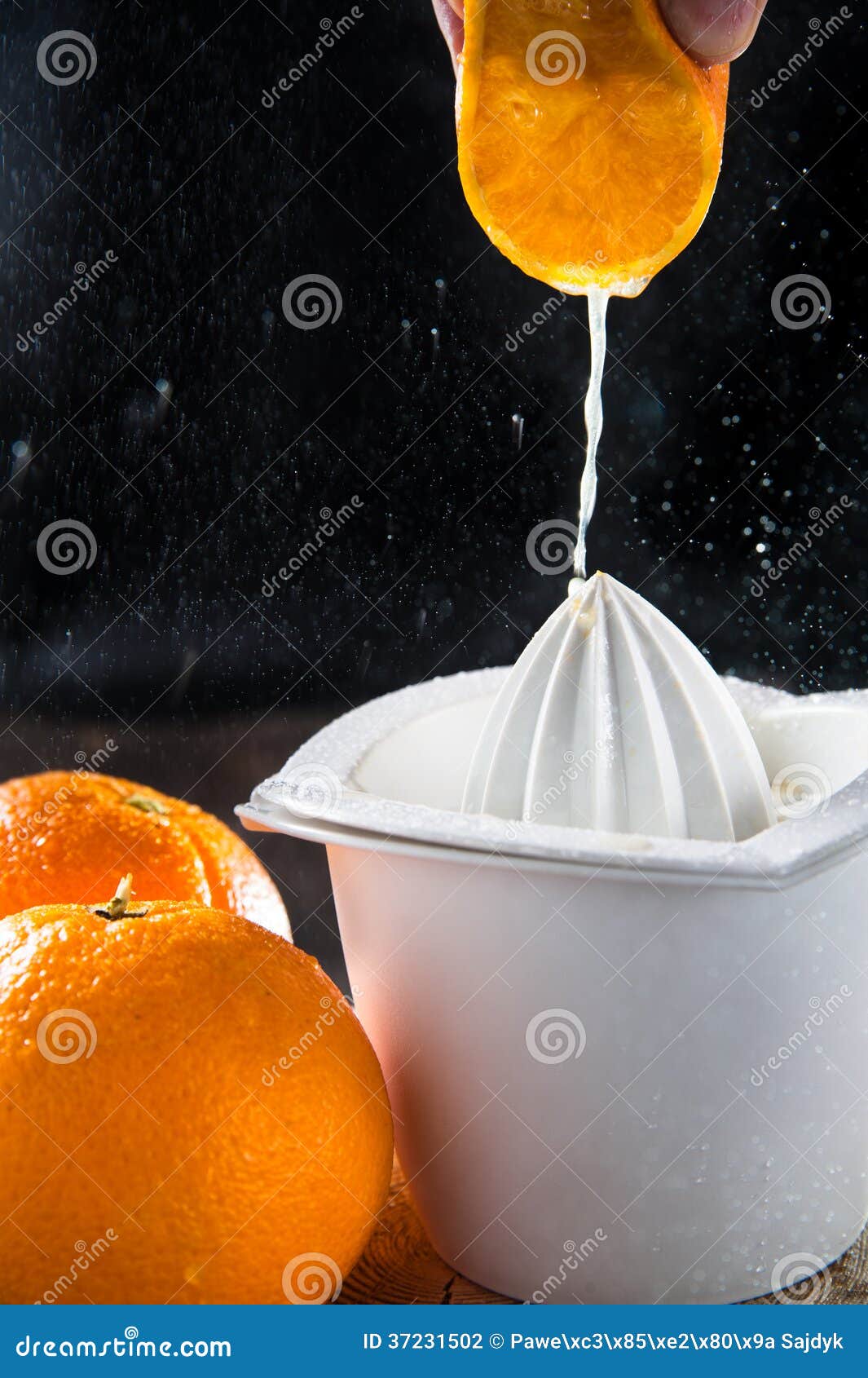 Orange juice squeeze out stock photo. Image of juiced - 37231502