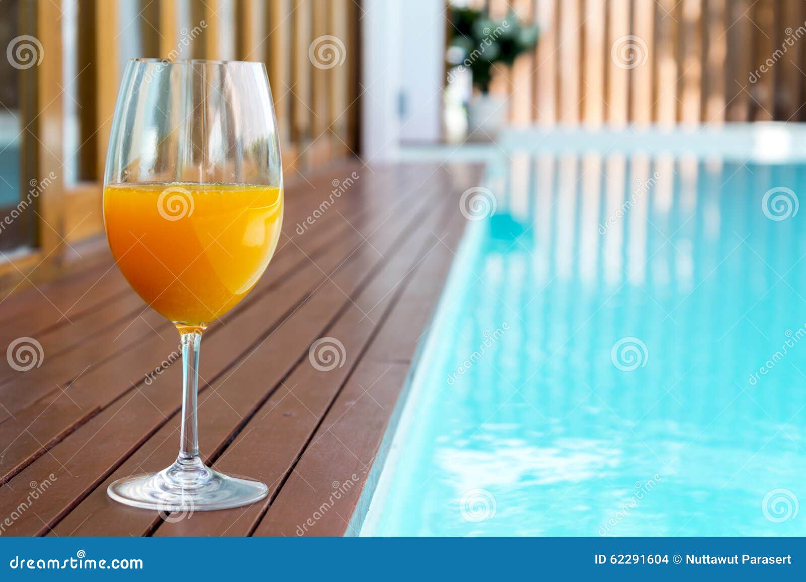 Orange Juice in Wine Glass on Edge the Blue Sky Pool Stock Photo ...