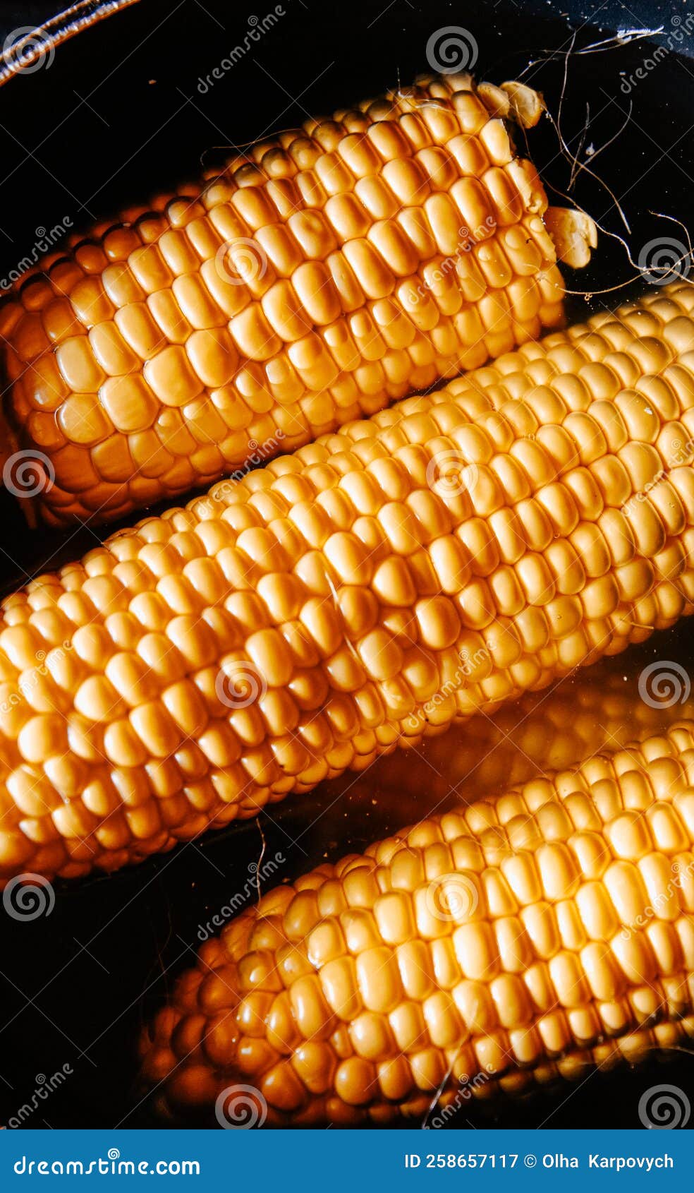 Orange Juicy Corn is Boiled in Water with Salt. Corn in Boiling Water ...
