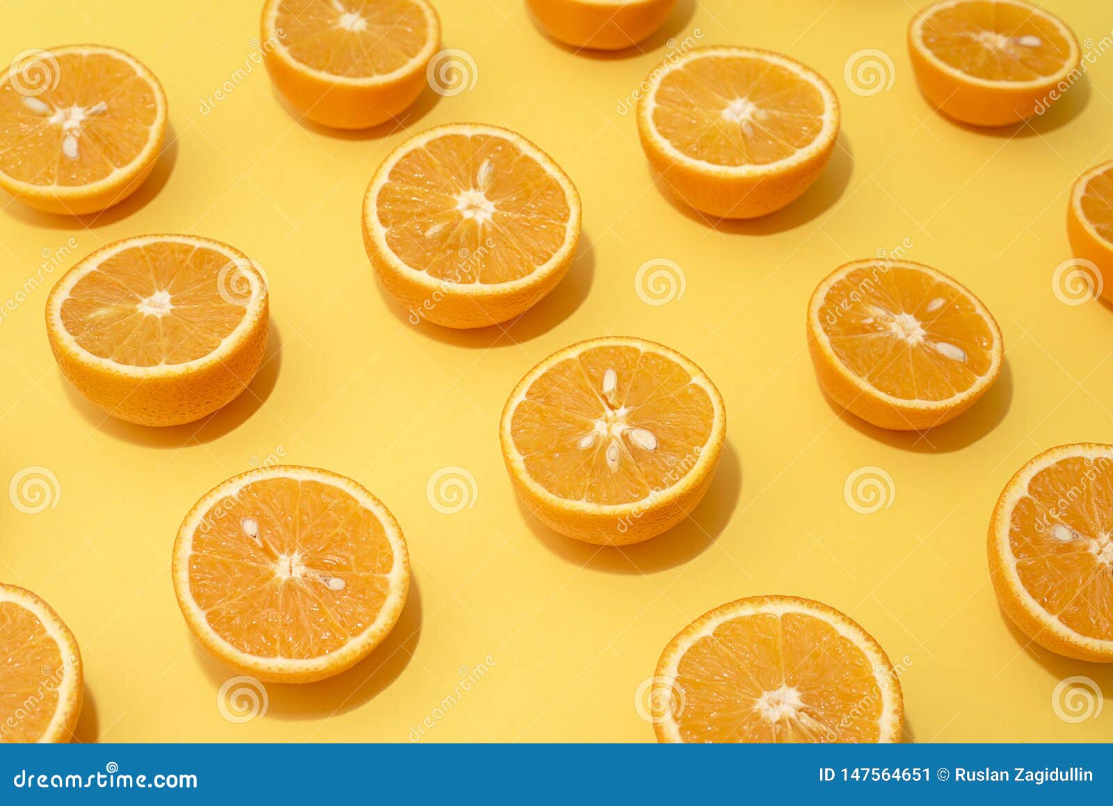 Orange Juicy Oranges Split in Half on Yellow Stock Image - Image of ...
