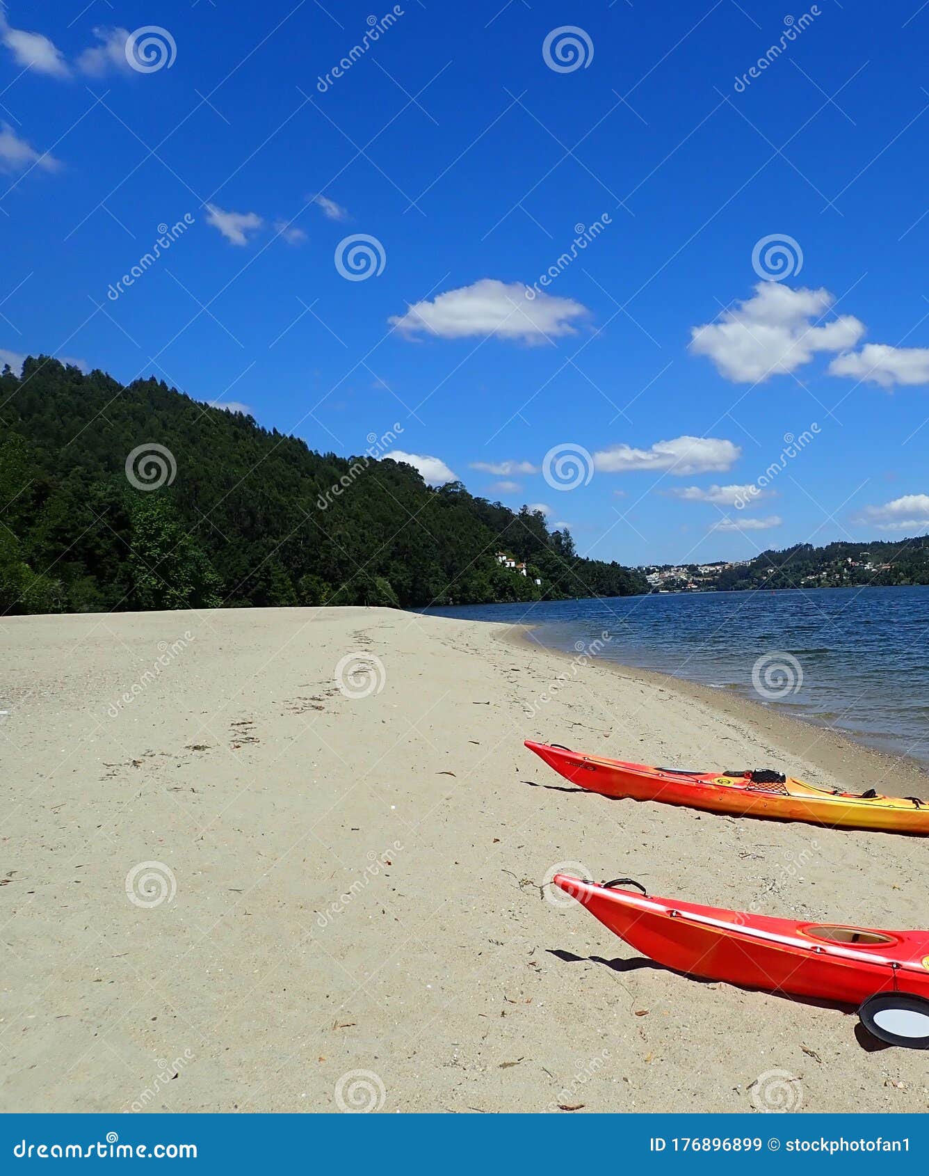 Orange Kayaks on the Sand on Shore of River Stock Image - Image of sand ...