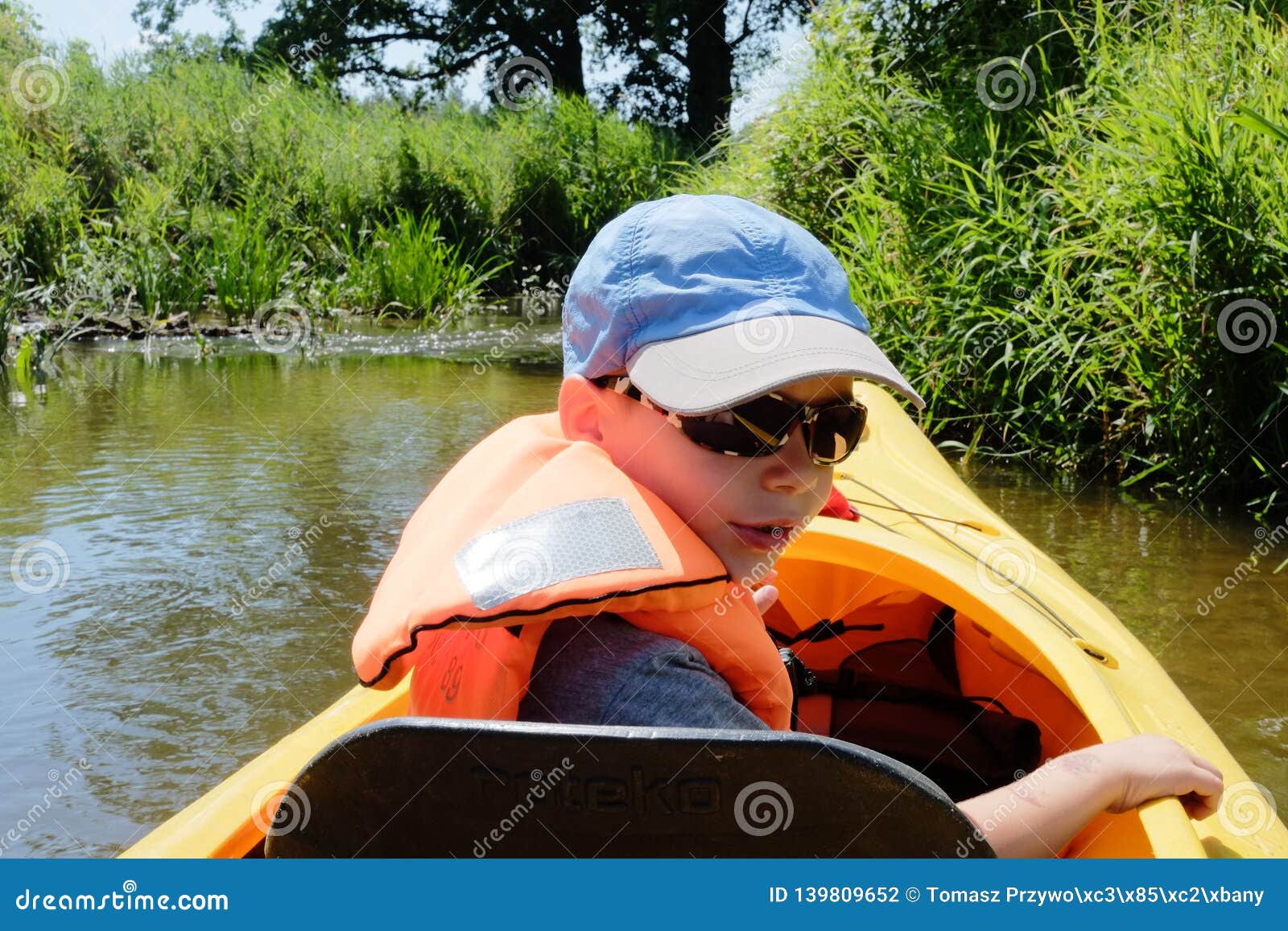 Orange Kayaks on a Small River Stock Photo - Image of kayaks, couch ...