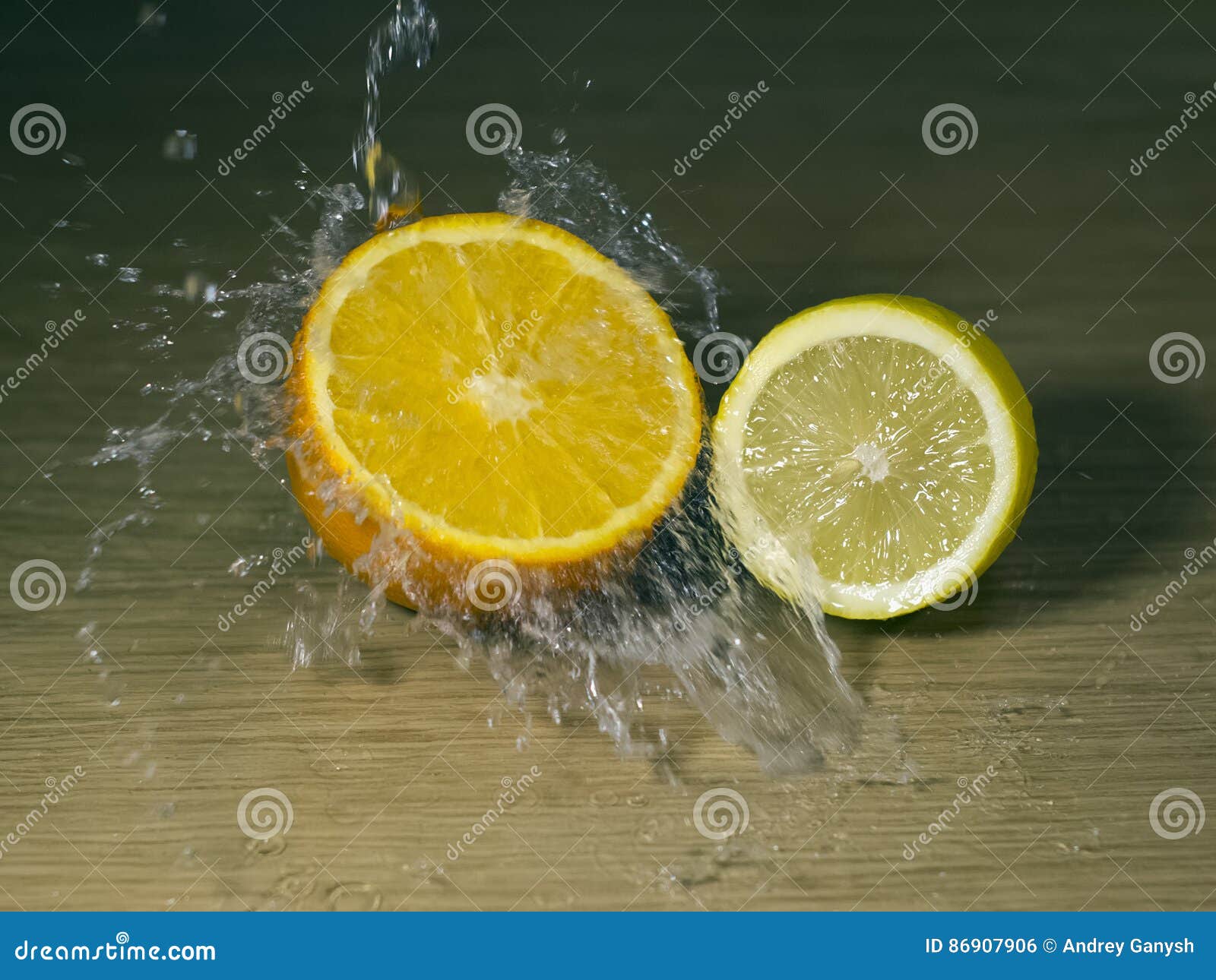 Orange and Lemon on a Wooden with Waterdrops Stock Photo - Image of ...