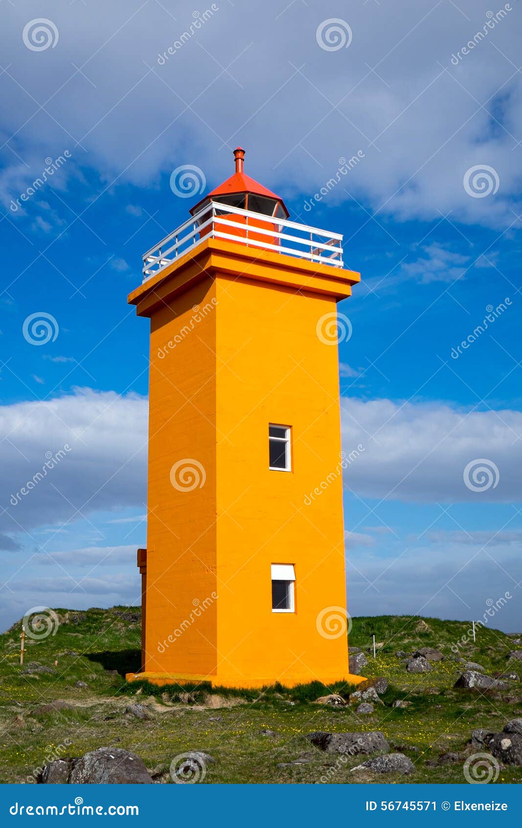 Orange Lighthouse in Iceland Stock Image - Image of sunset, shipping ...
