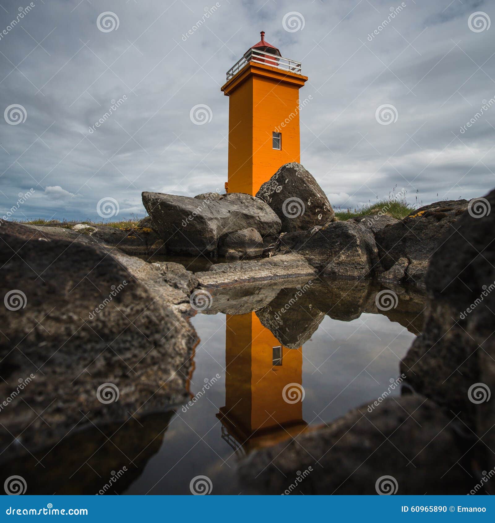 Orange Lighthouse at the Westcoast of Iceland Stock Photo - Image of ...