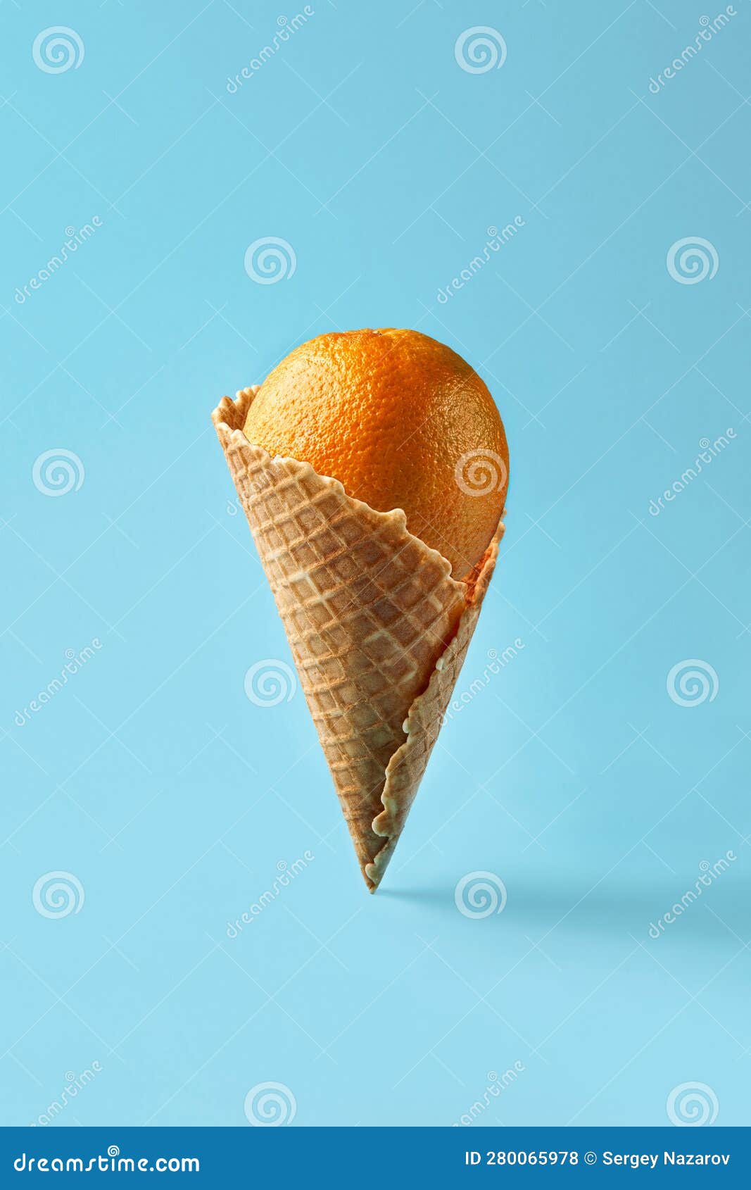 Orange Like Ice Cream Lies in Waffle Cone on a Light Blue Background ...