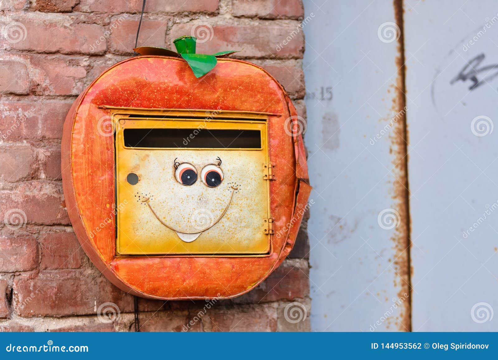 Orange Mailbox with Smile, Mailbox Hanging on the Wall Stock Photo ...