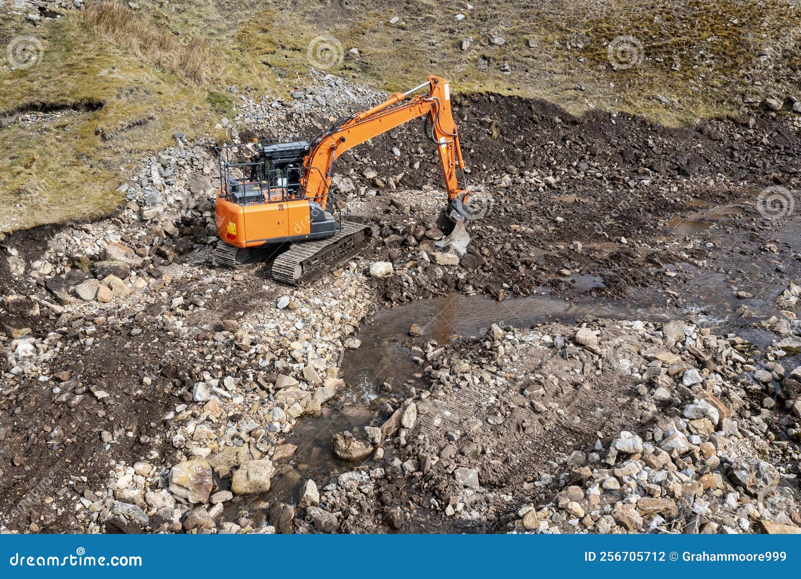 Orange Mechanical Excavator at Work Stock Photo - Image of loading ...