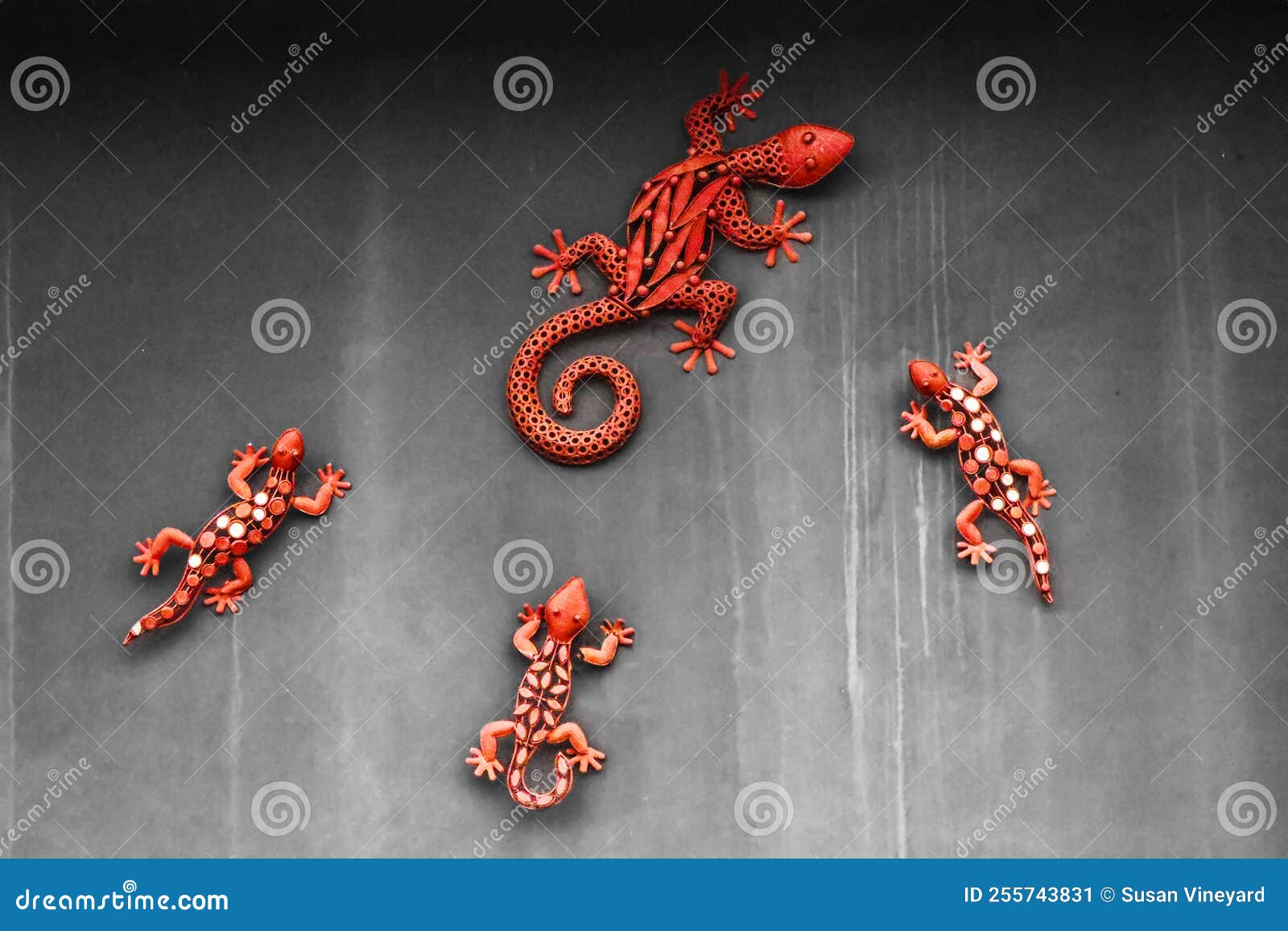 Orange Metal Lizards on Concrete Wall Copy Stock Image - Image of ...
