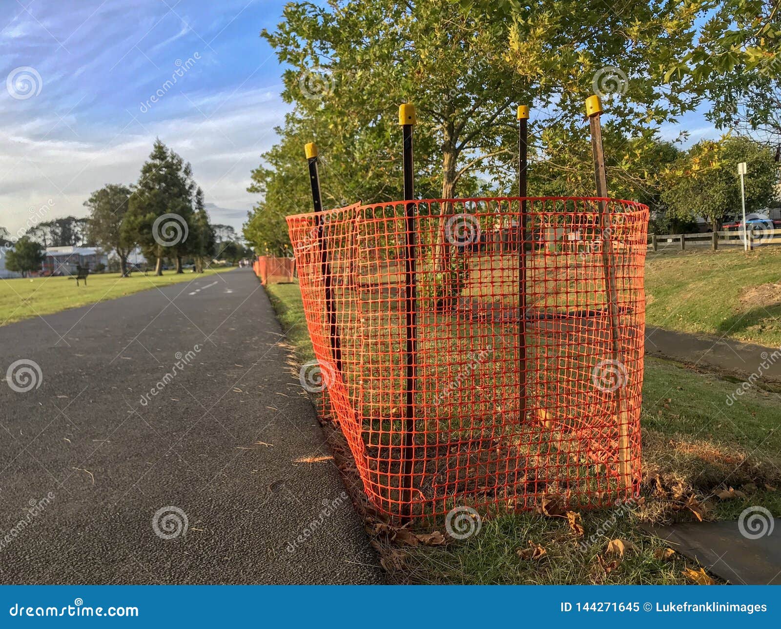 Orange Netting Along Park Pathway Stock Image - Image of concept ...