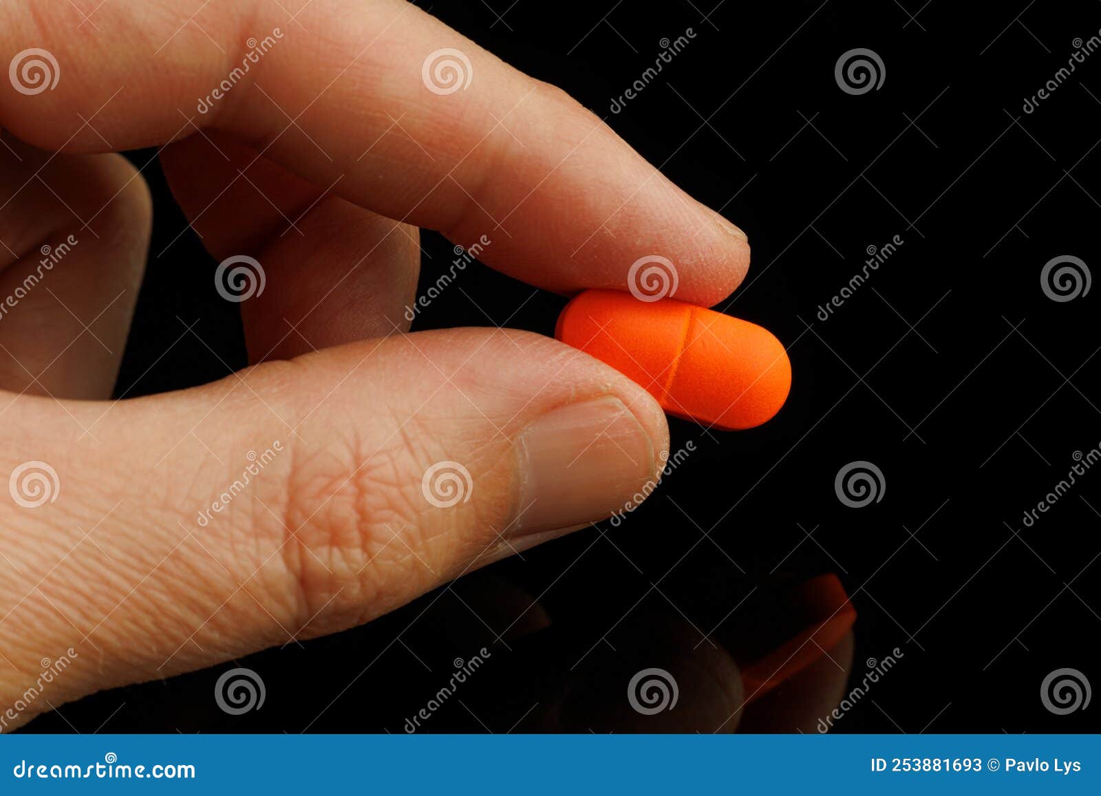 Orange Oblong Tablet in Hand Stock Image - Image of object, tablet ...