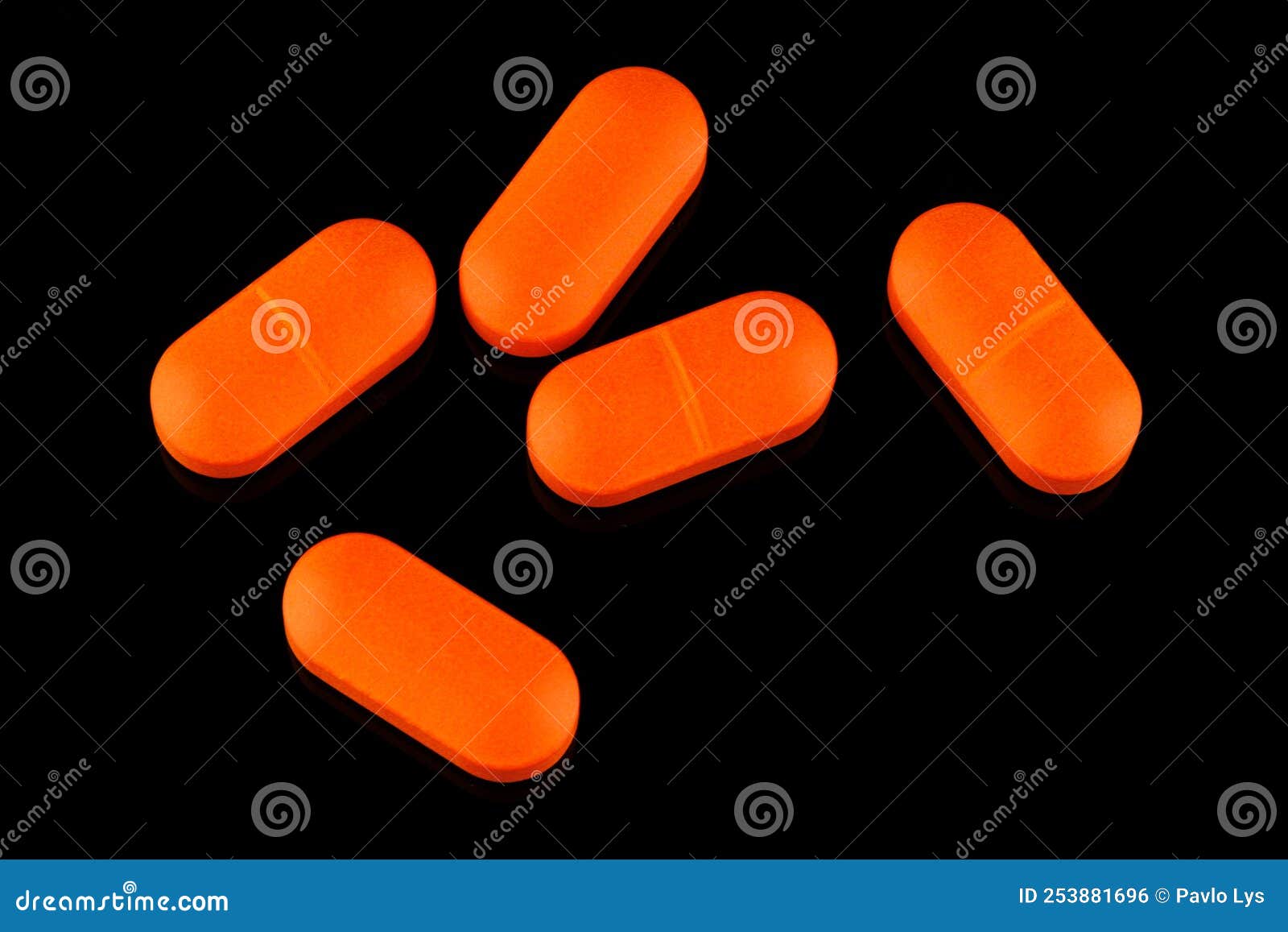 Orange Oblong Tablets Black Background Stock Photo - Image of ...