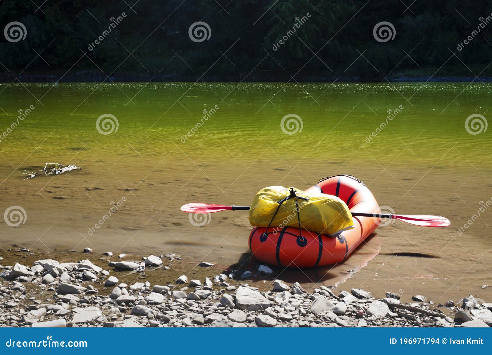 Orange Packraft Rubber Boat with Backpack on a River Stock Photo ...