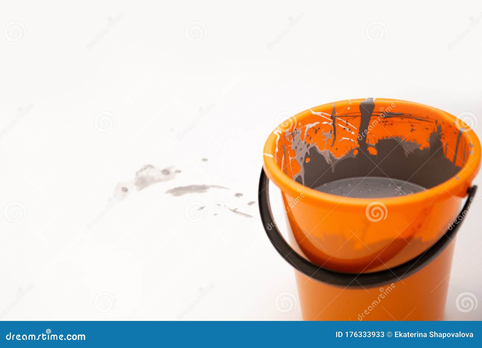 Orange Pail with Gray Paint on White Background Stock Image - Image of ...