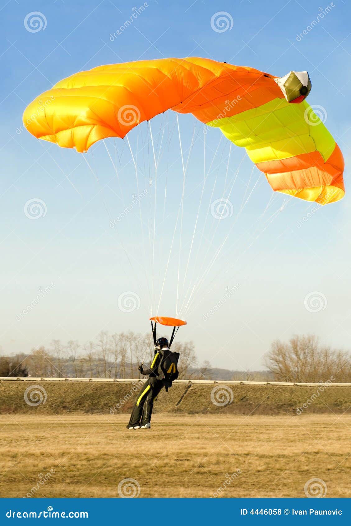 Orange parachute landind stock photo. Image of life, activity - 4446058