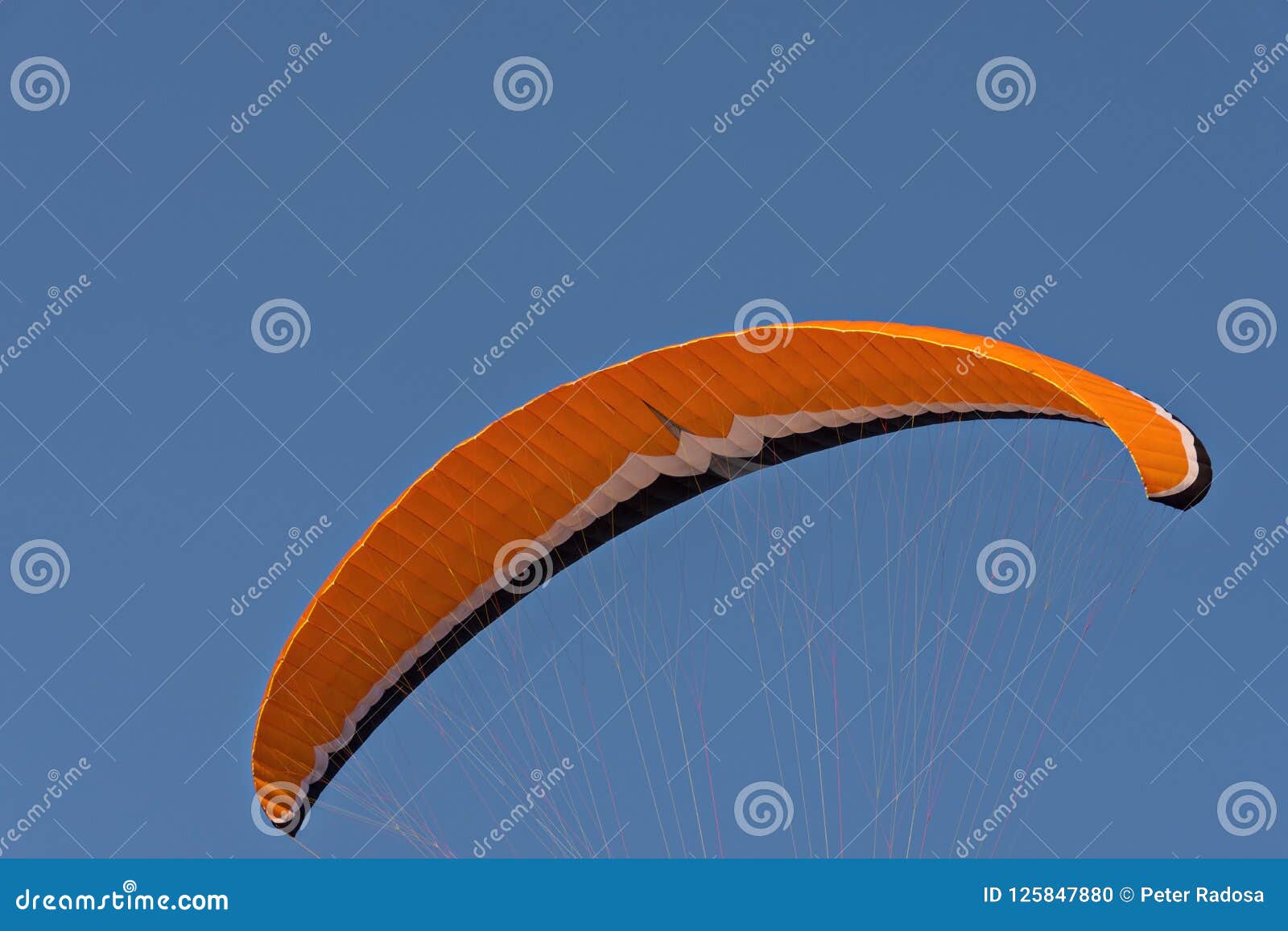 Orange Parachute with Ropes Stock Photo - Image of flying, light: 125847880