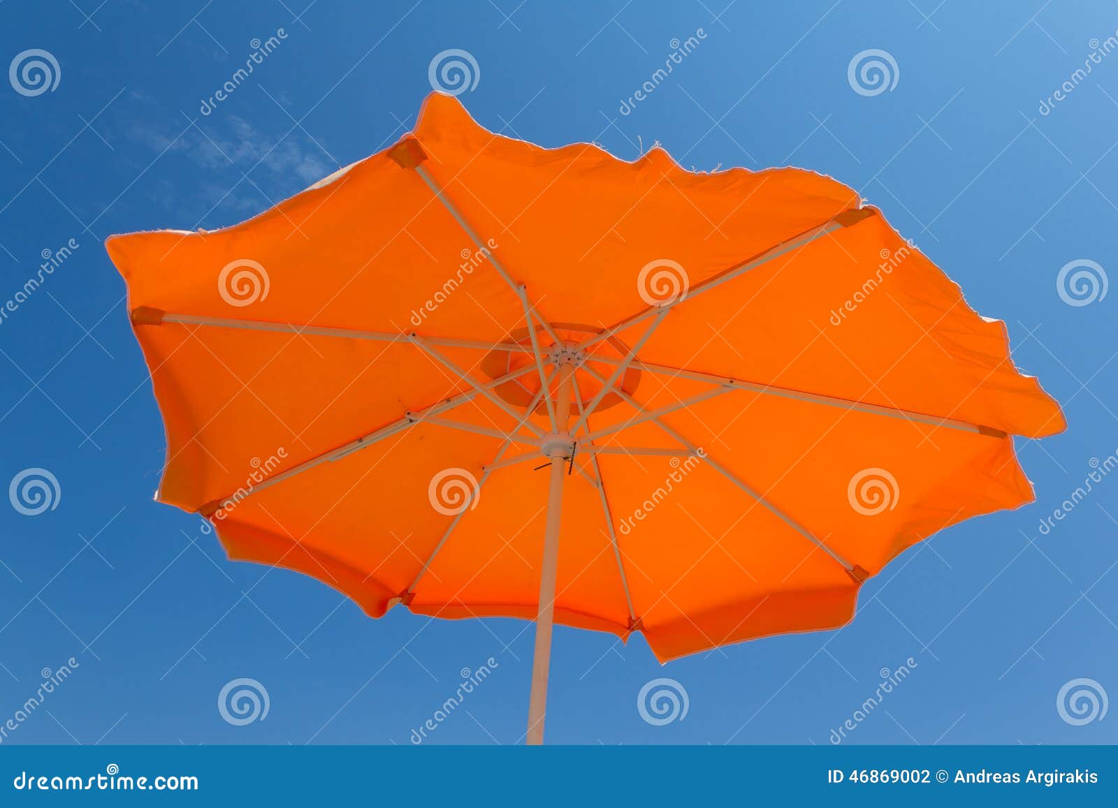 Orange Parasol Against a Blue Sky Stock Photo - Image of beautiful ...