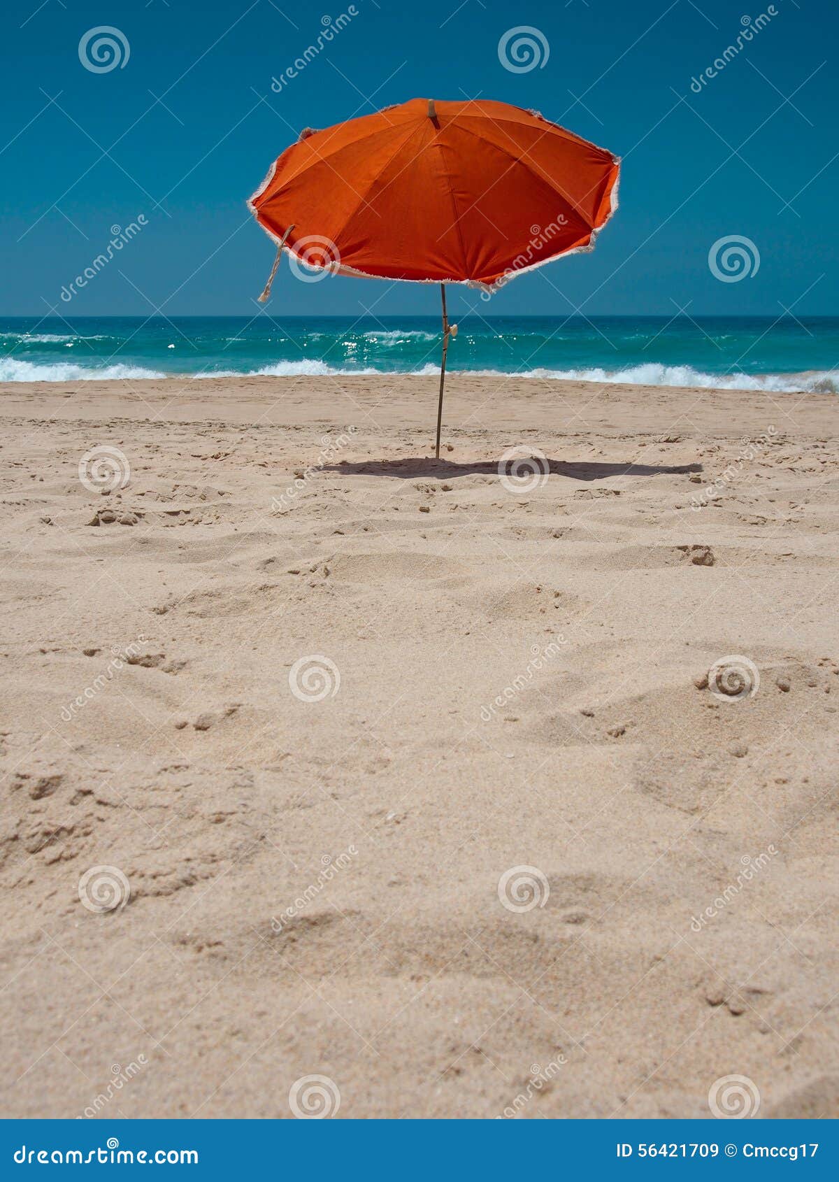 Orange Parasol on the Beach Stock Image - Image of coastal, beach: 56421709