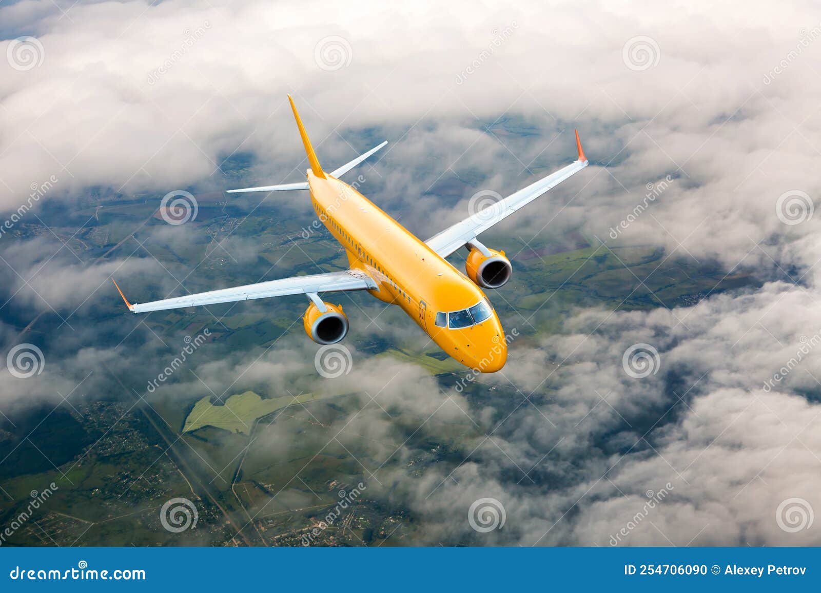 Orange Passenger Aircraft Flies High Above the Clouds Stock Photo ...