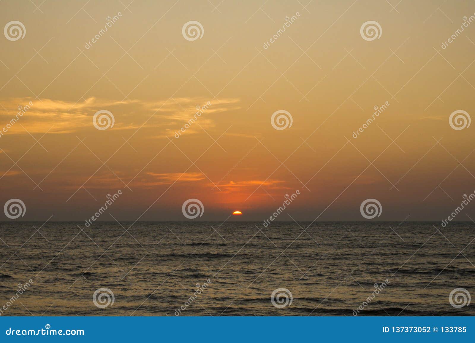 A Orange Pink Gray Sunset Sky Over the Ocean Stock Photo - Image of ...