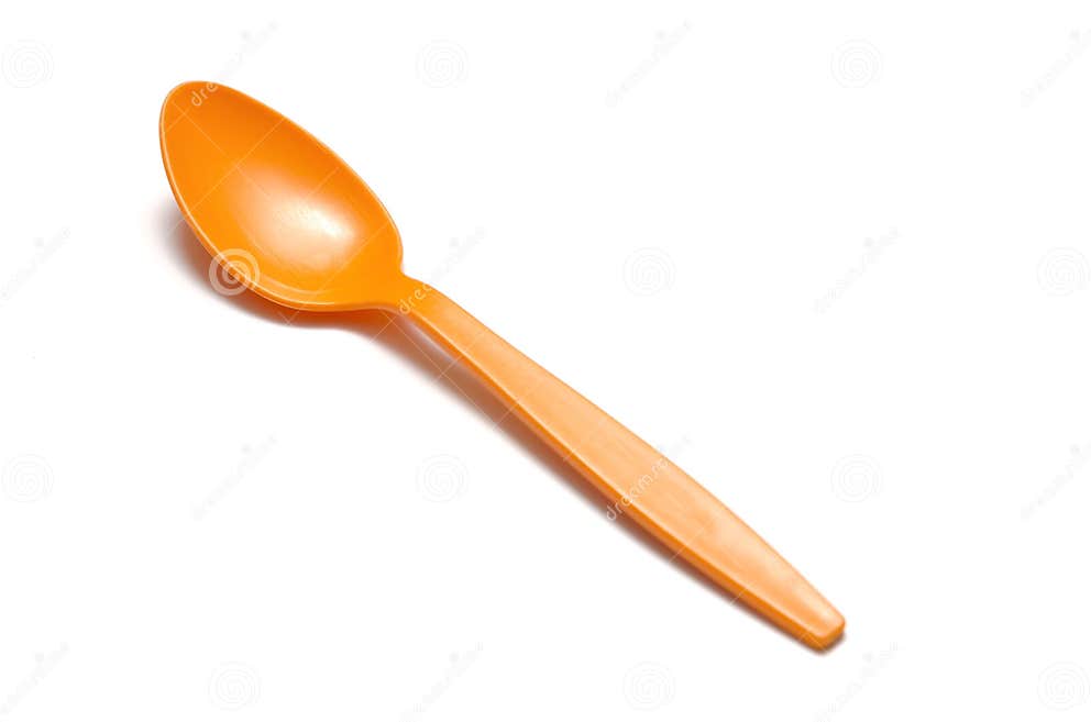 Orange plastic spoon stock photo. Image of dinnerware - 47152184