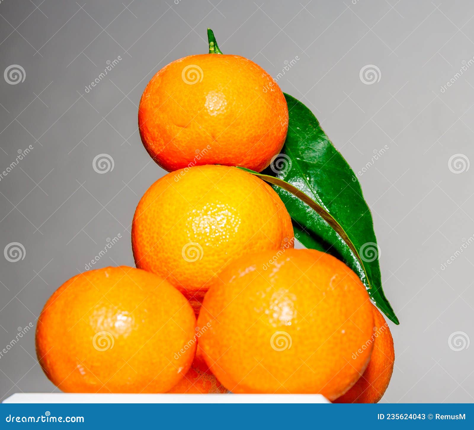 Orange Pyramid with Green Leaves, Drying. Stock Image - Image of card ...