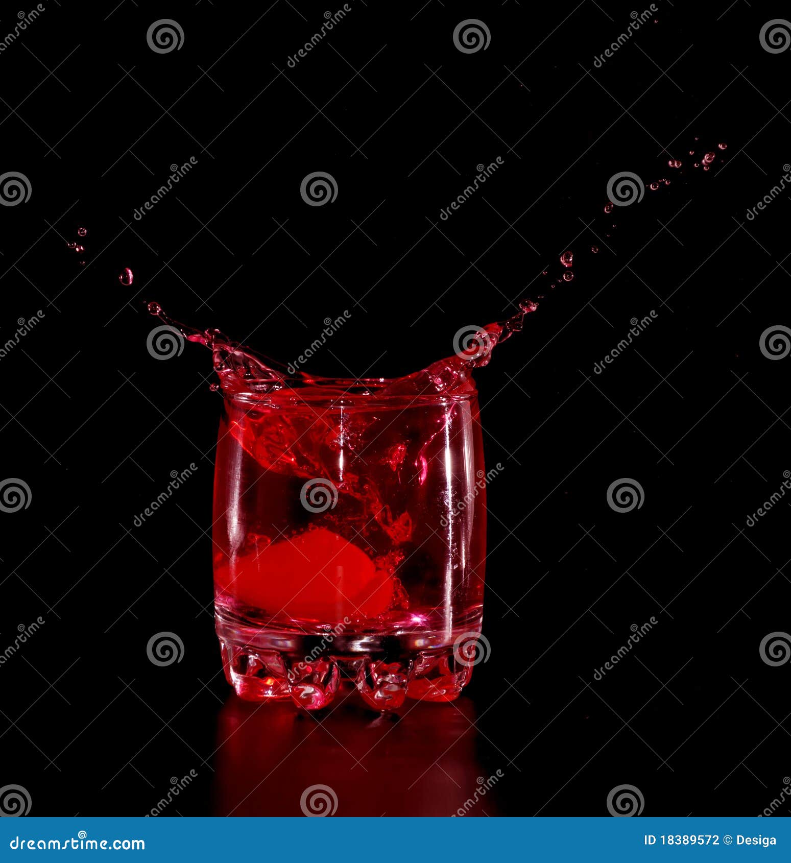 Orange in red water splash stock photo. Image of crimson - 18389572