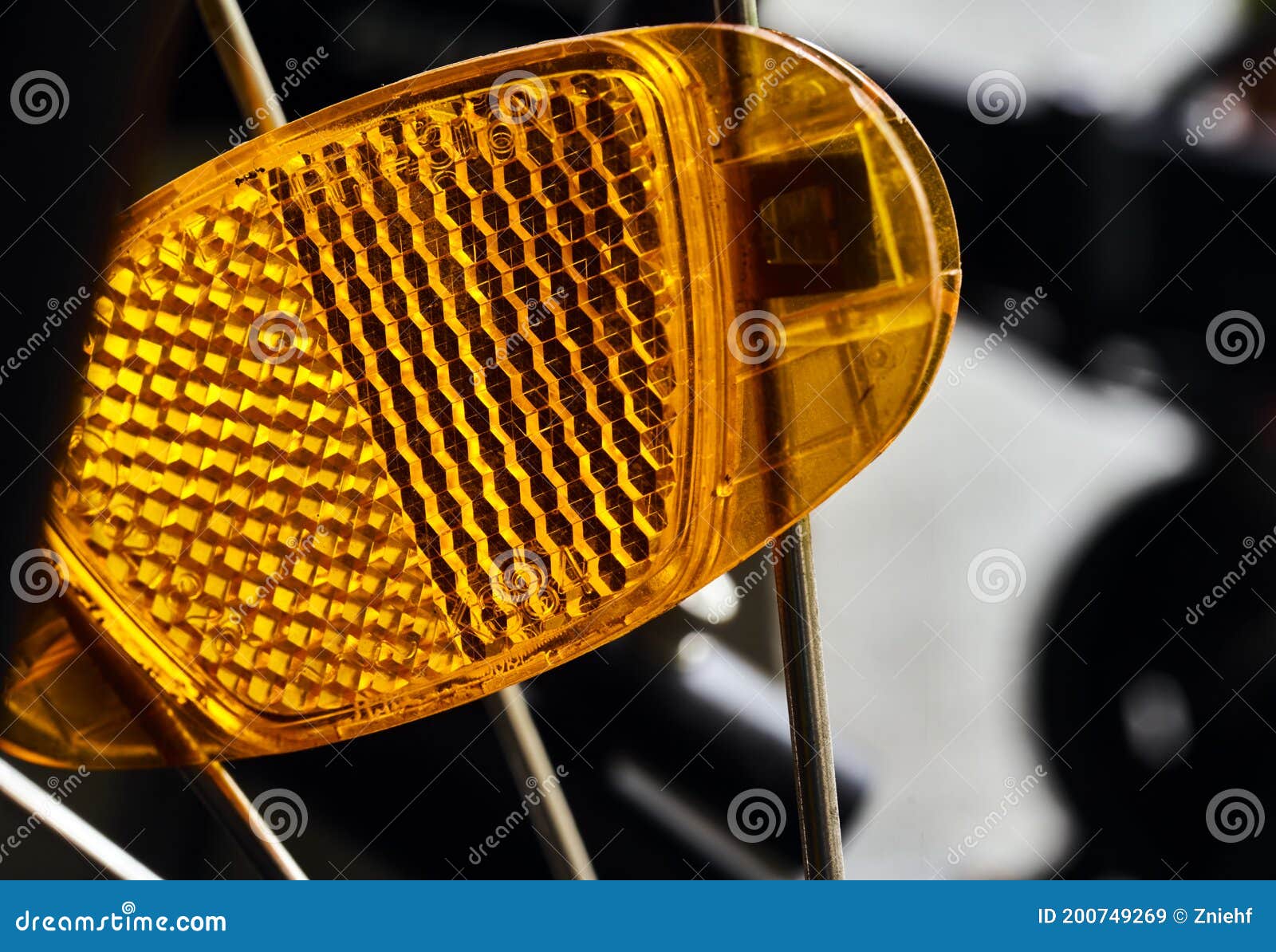 Orange Reflector between the Spokes of a Bicycle To Increase Road ...