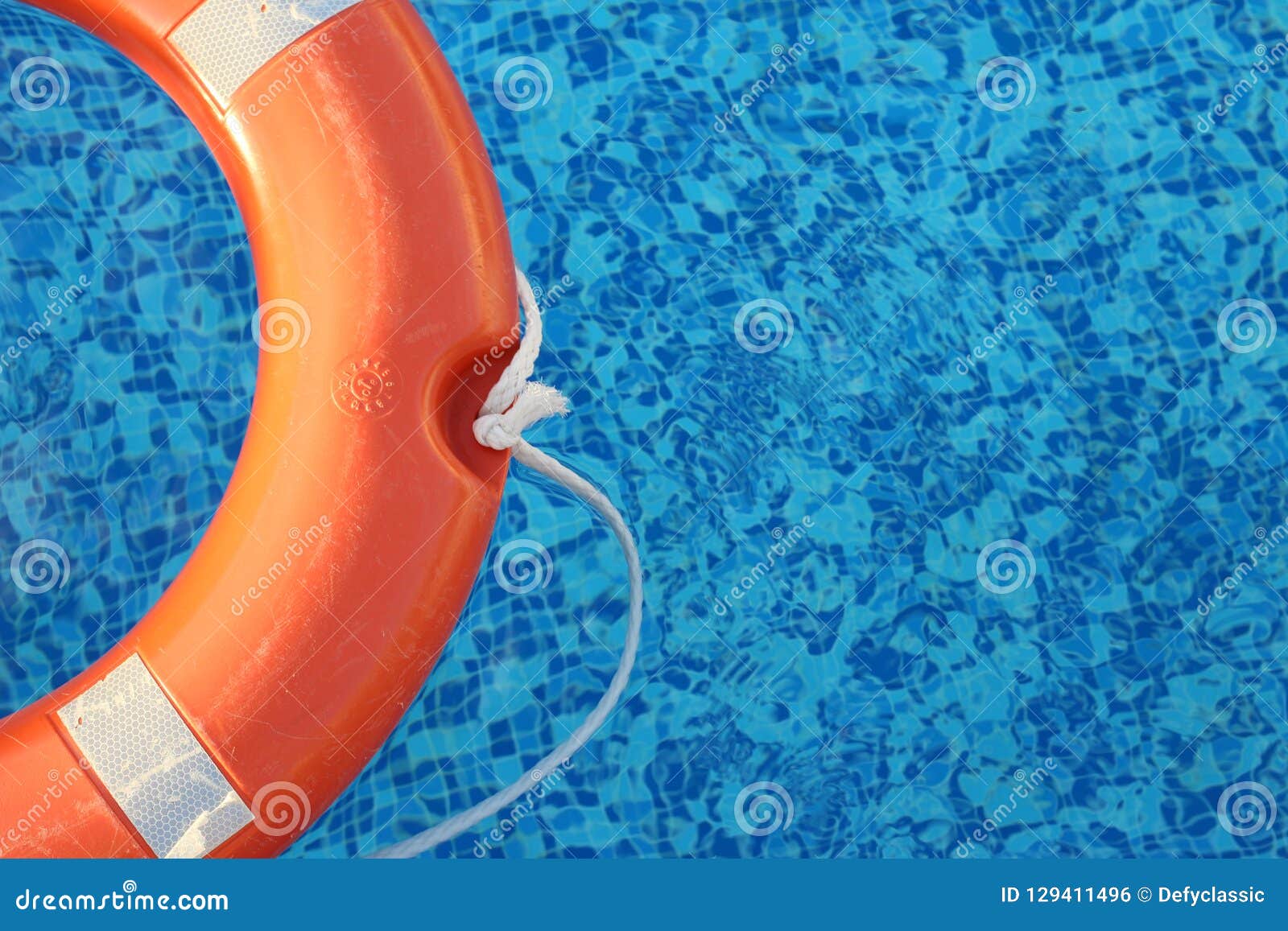 Orange Rescue Life Ring stock photo. Image of circle - 129411496