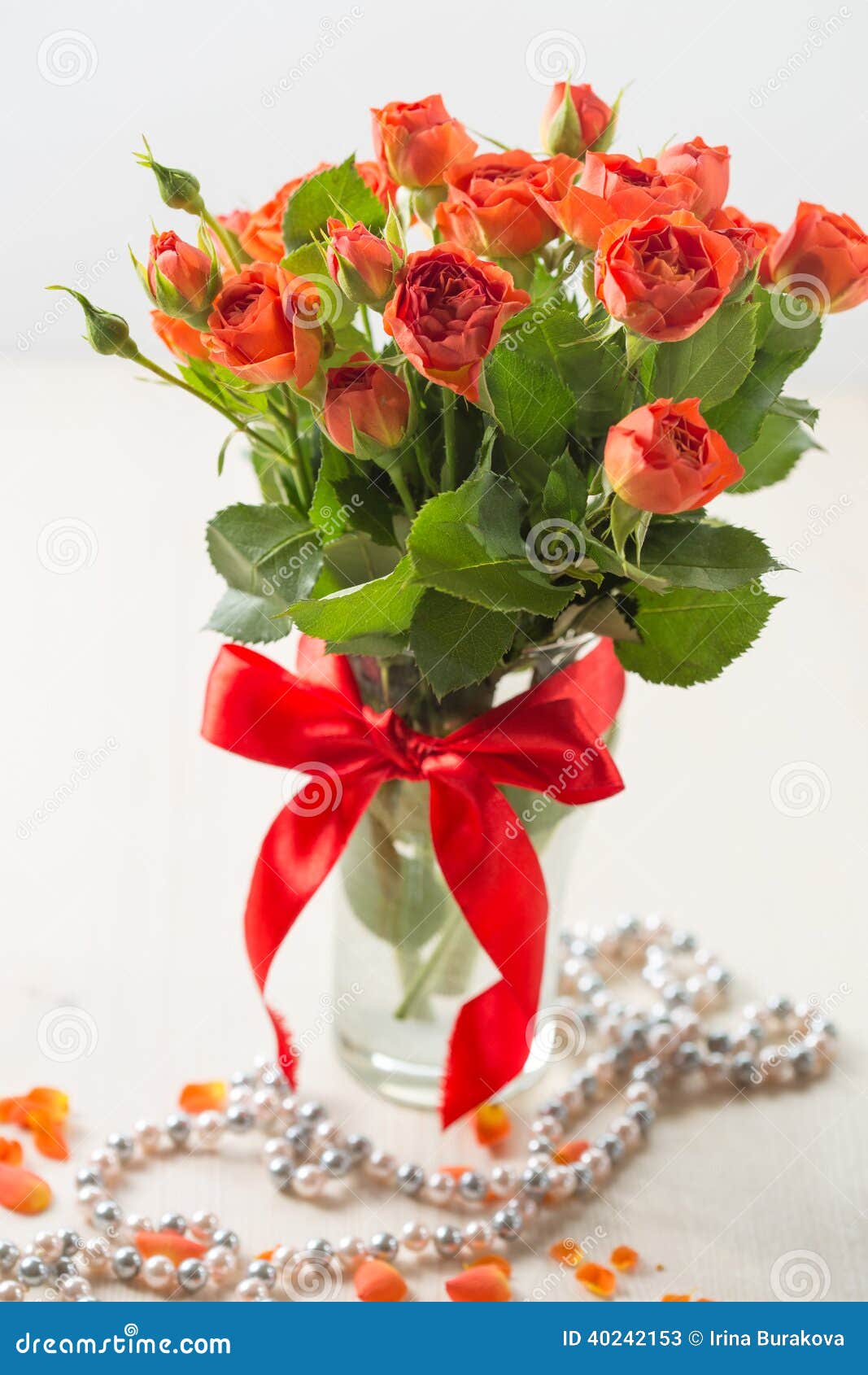 Orange roses in vase stock image. Image of love, celebrations - 40242153