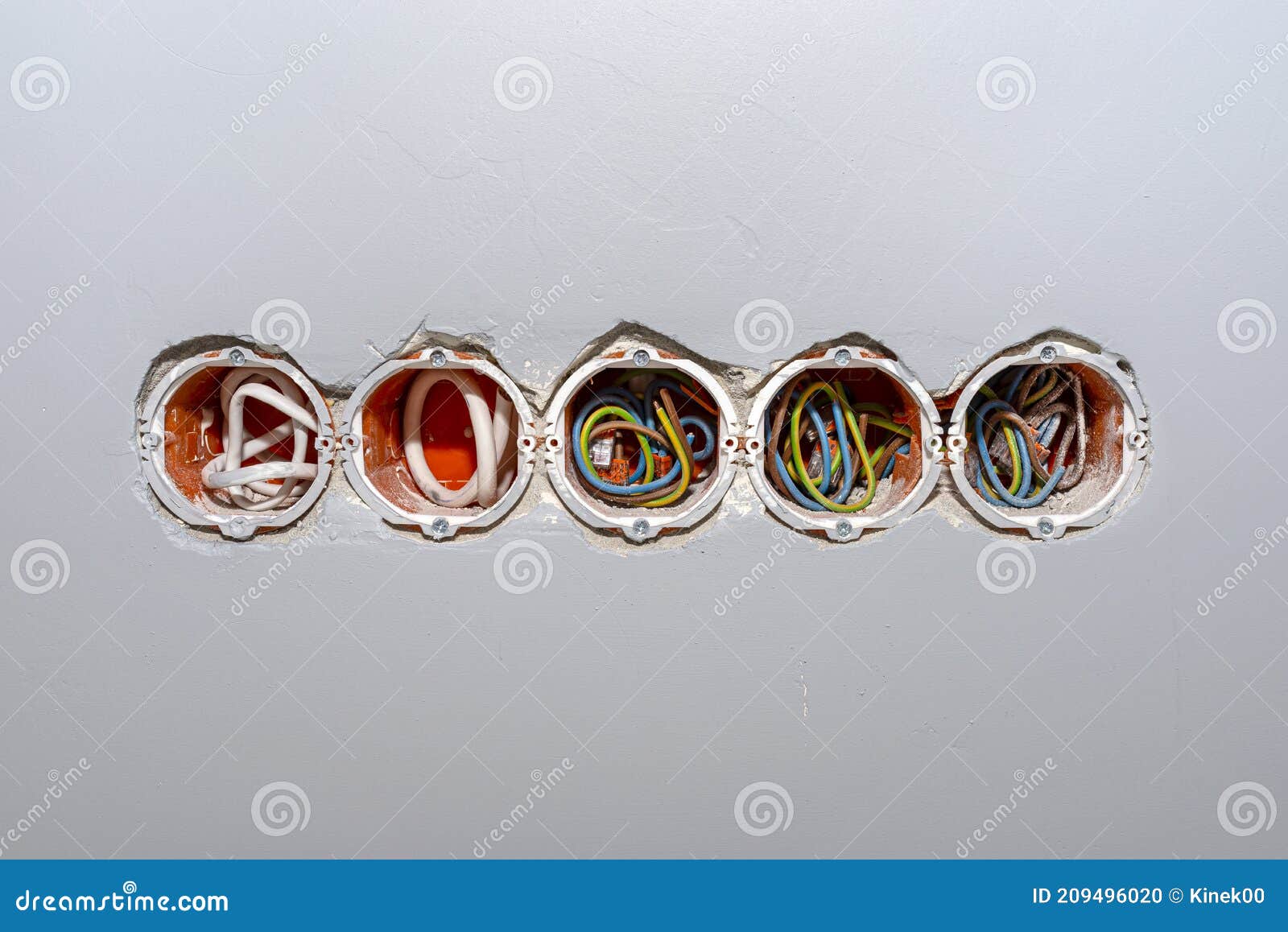 Orange, Round Installation Box Mounted in a White Wall with an ...