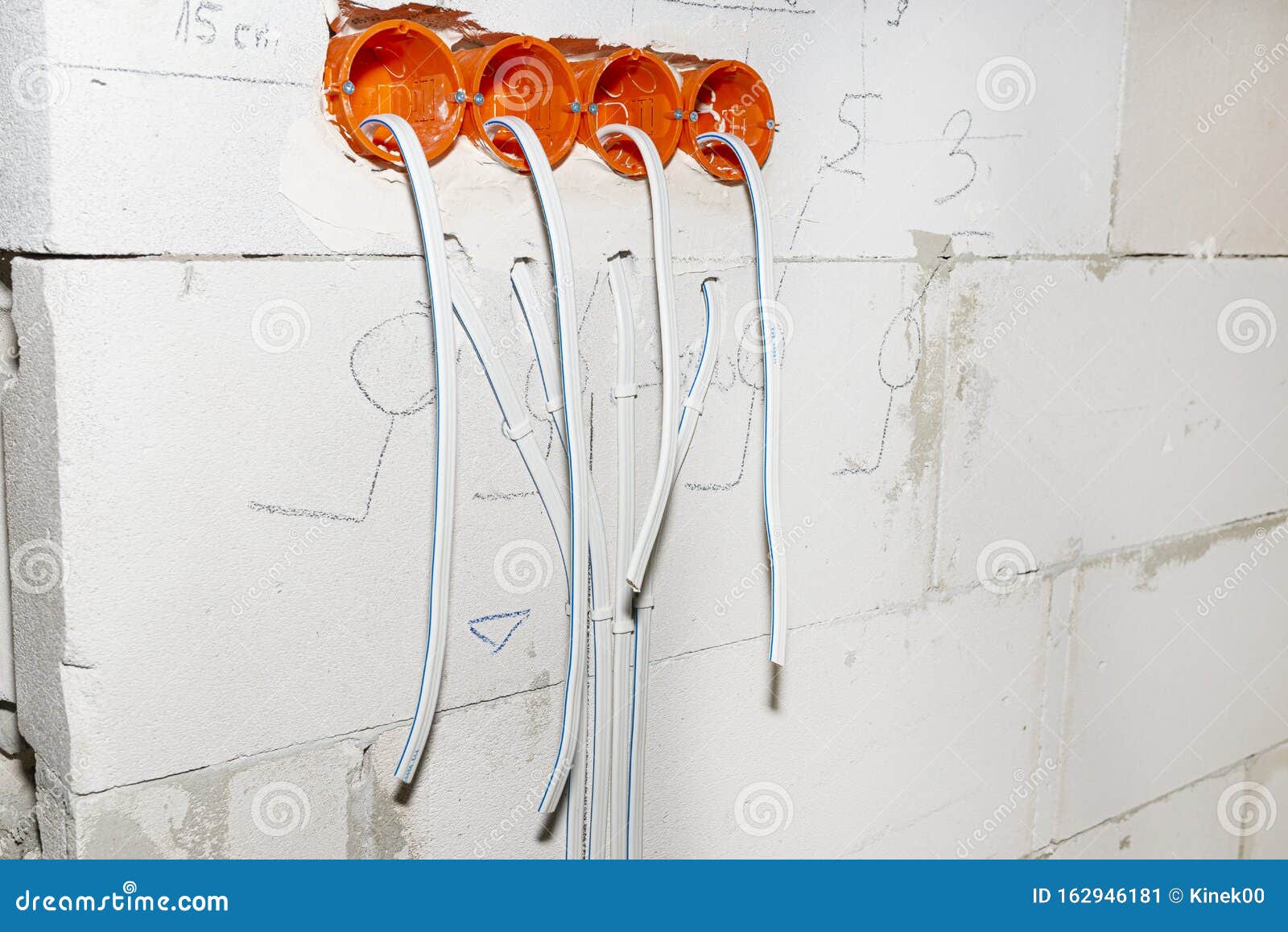 Orange, Round Junction Box Mounted in the White Wall with Protruding ...