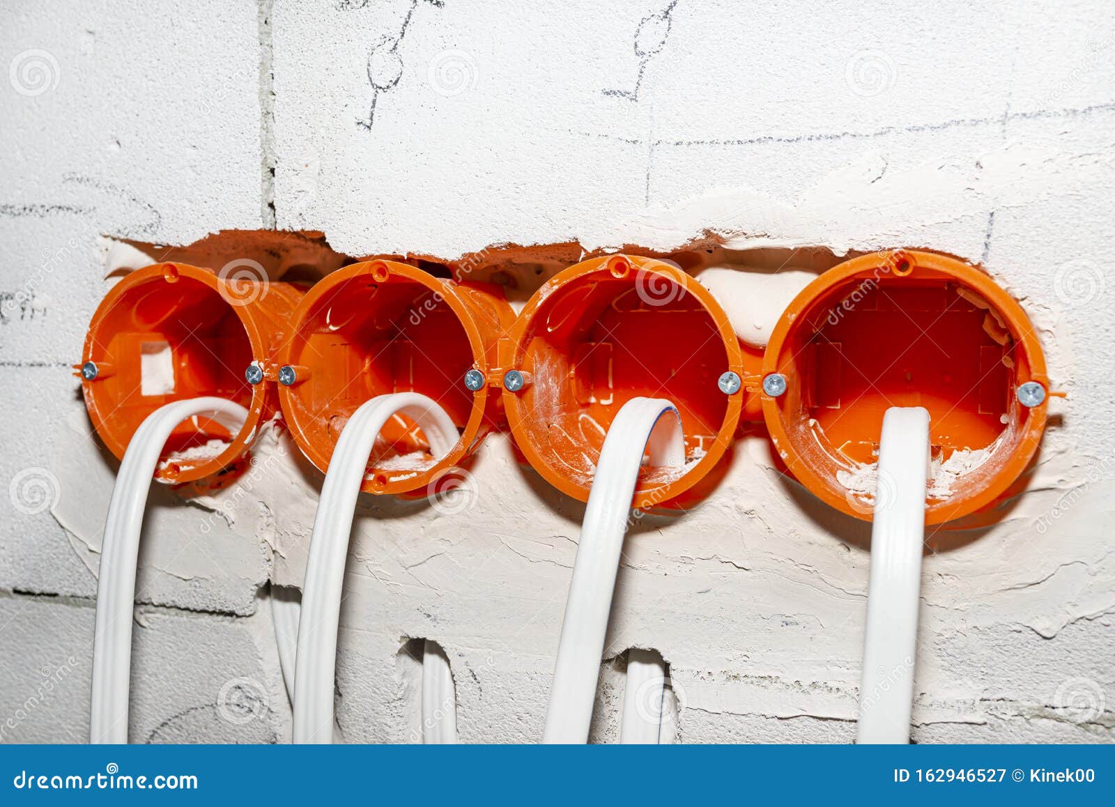 Orange, Round Junction Box Mounted in the White Wall with Protruding ...
