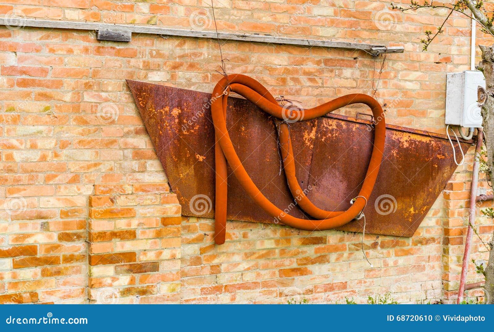 Orange Rubber Hose on Peeling Wall Stock Photo - Image of rusted, rust ...