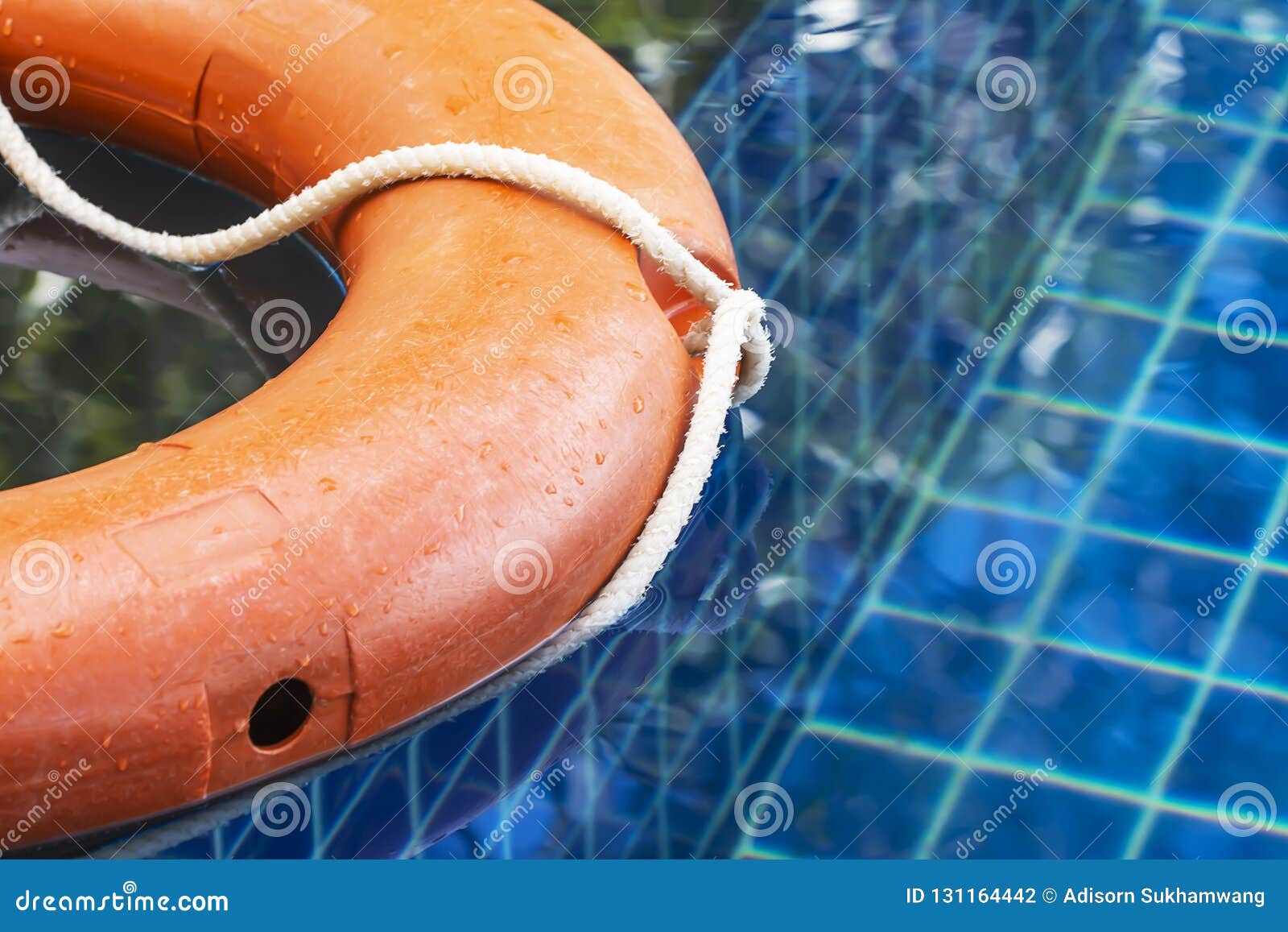 Orange Rubber Ring for Life in the Pool. Stock Photo - Image of ...