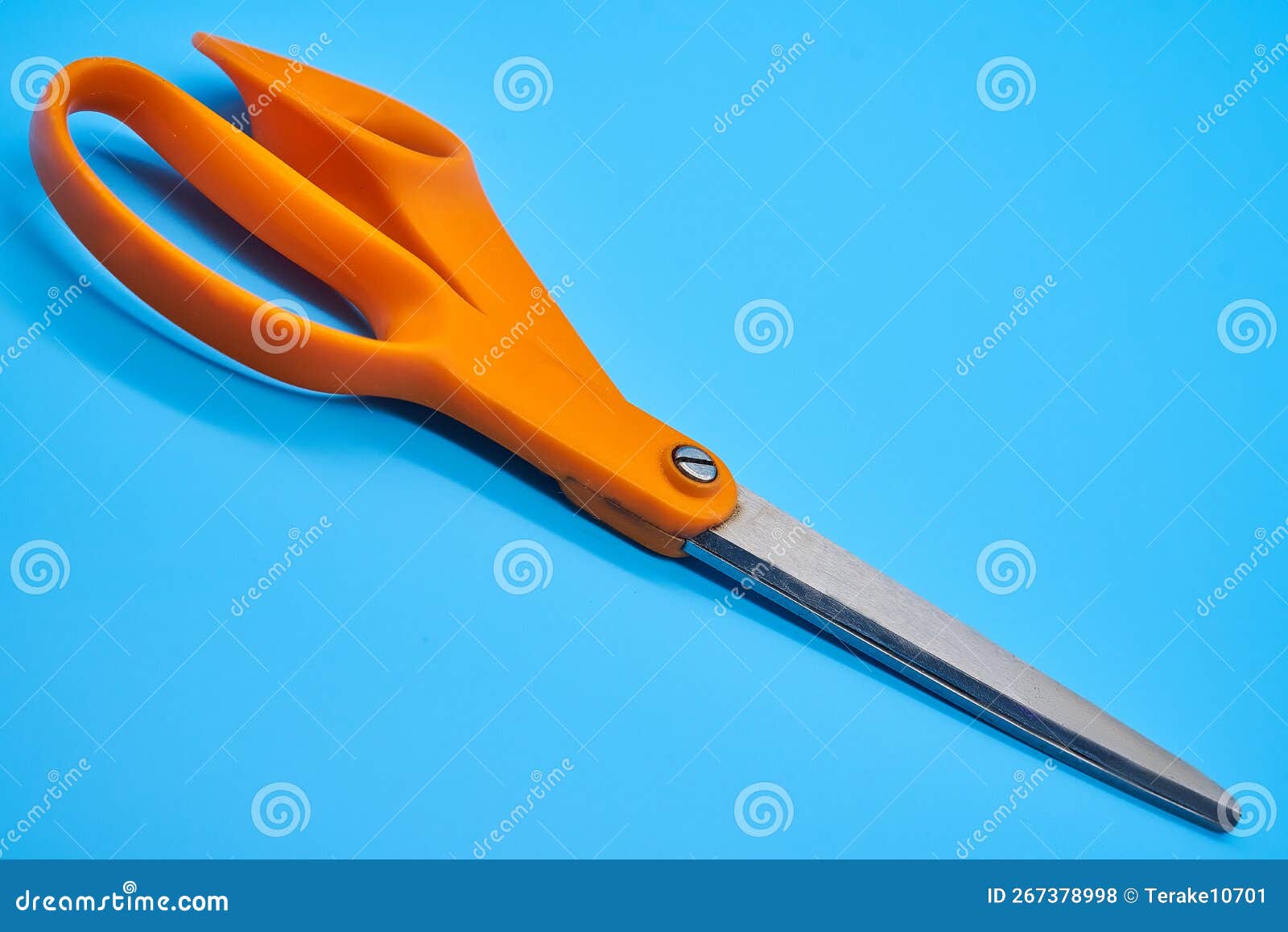 Orange Shear Scissors on a Light Blue Background Cutting Shears Stock ...