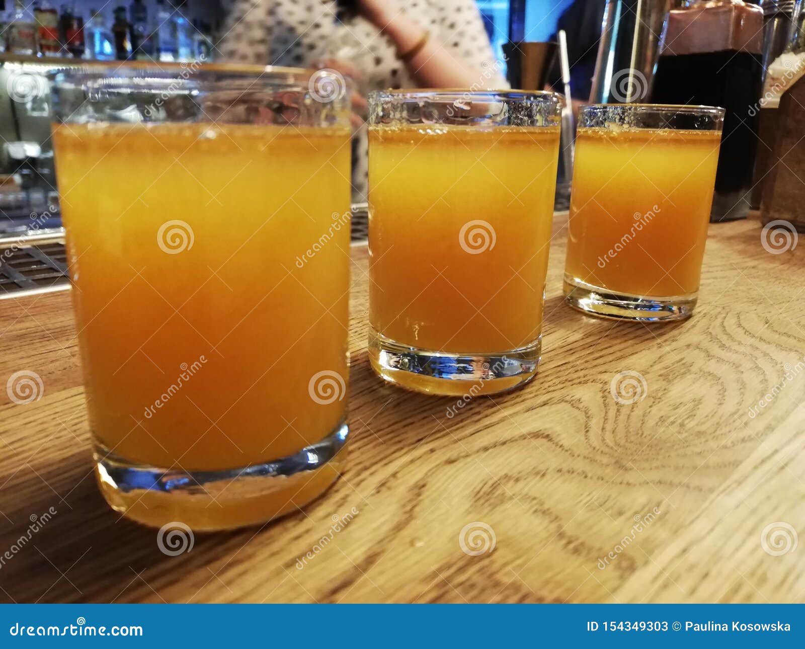 Orange shots line stock image. Image of alcohol, orange - 154349303