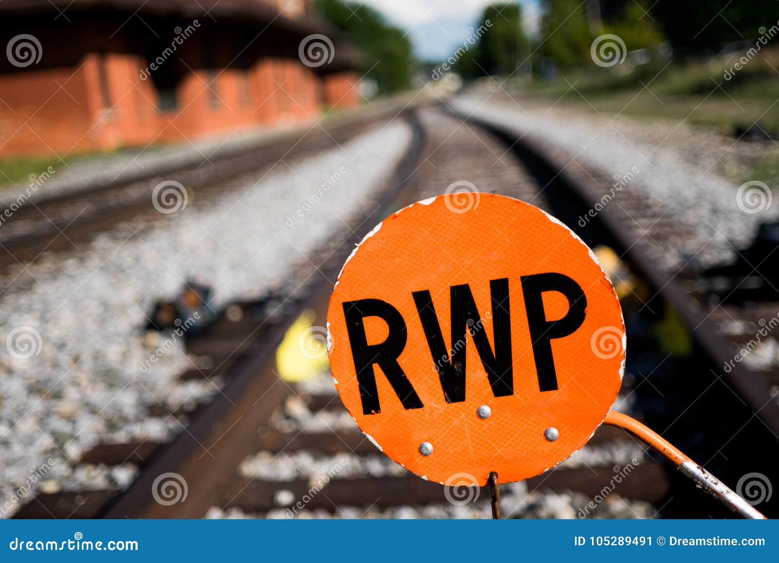 Train Rails and Orange Sign Showing the Path Stock Image - Image of ...